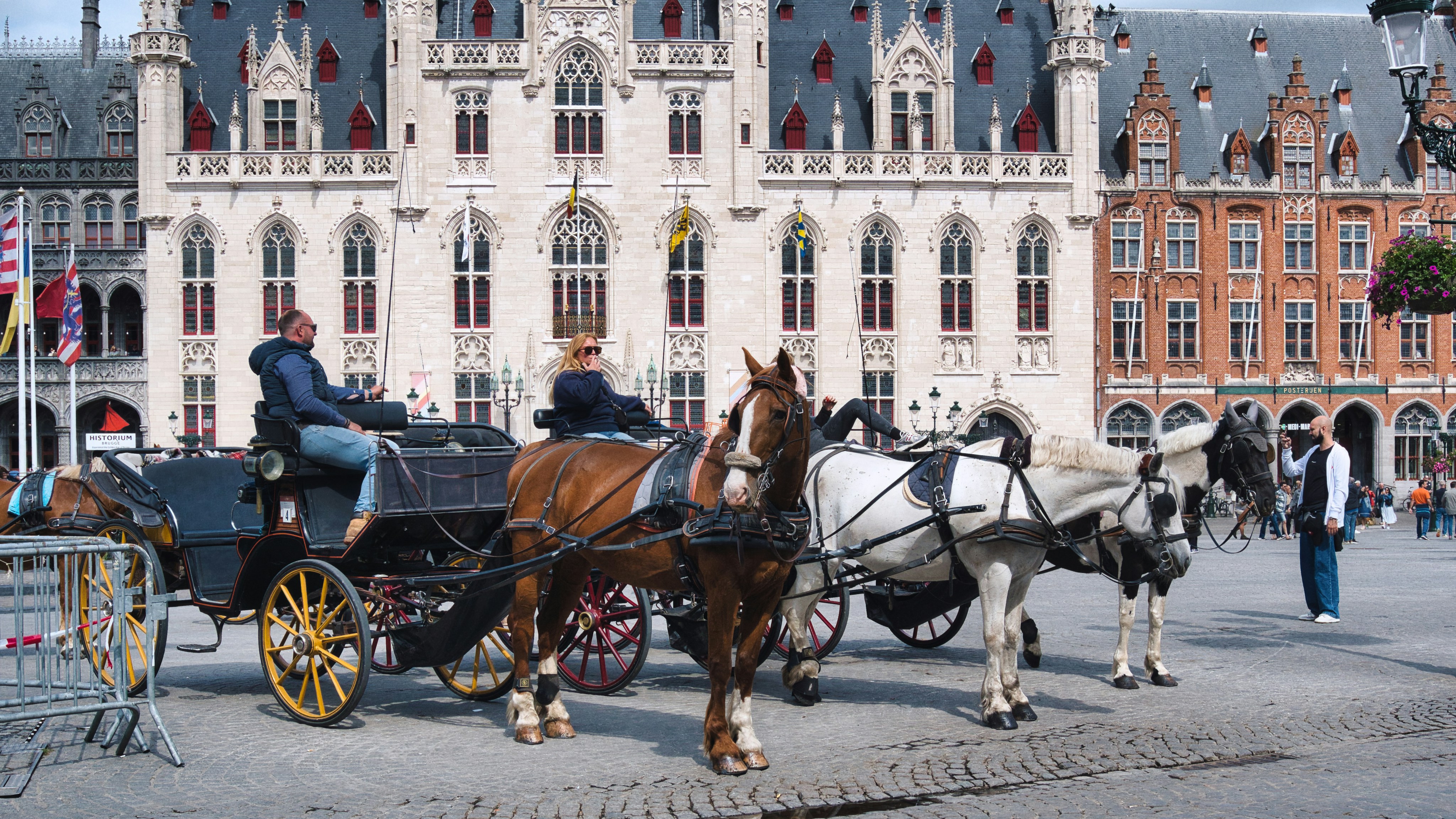 Equestrian Parade in a Historic Flemish Square