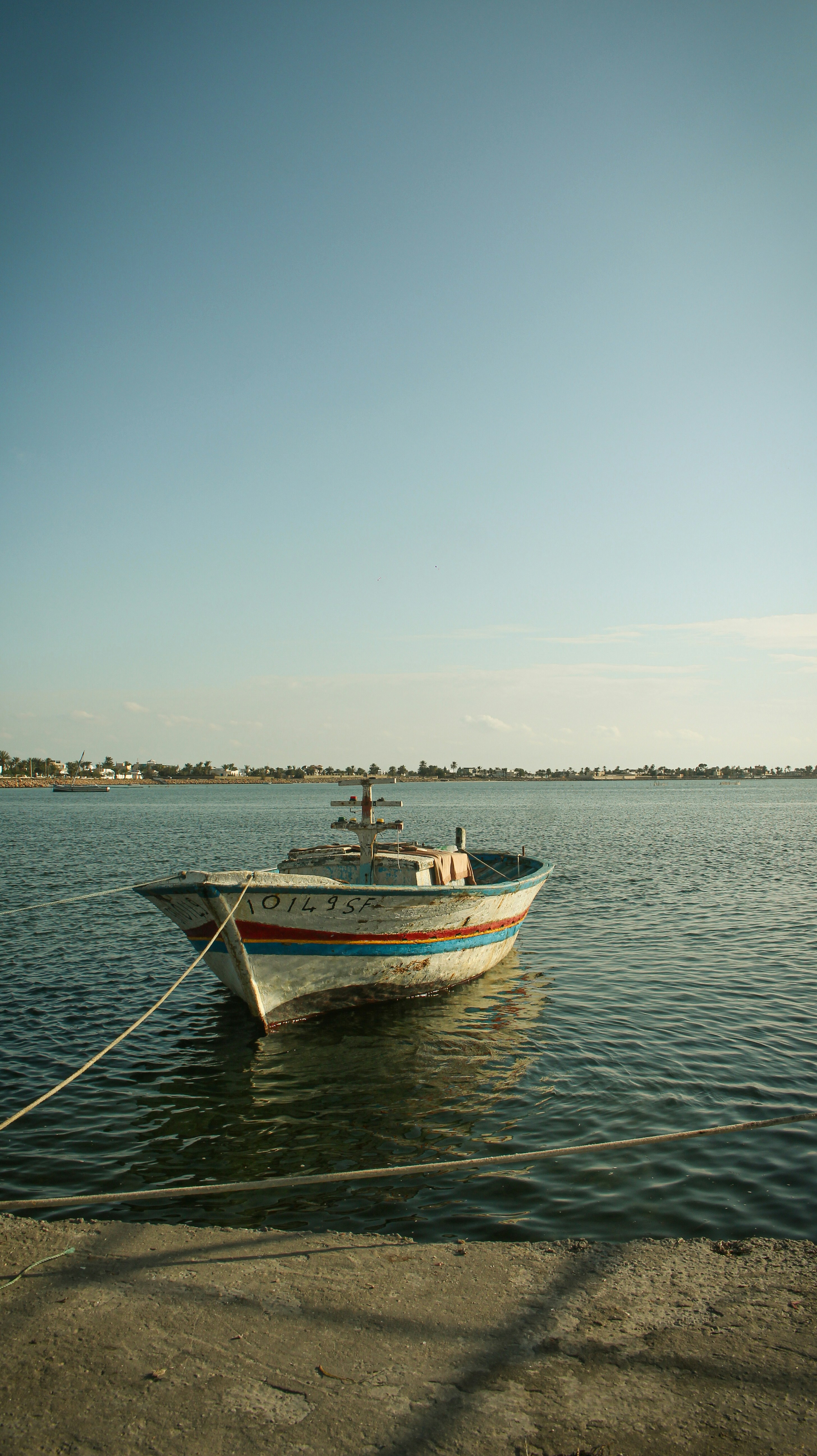 Boat at the Quiet Harbor: A Little Vessel by the Shore
