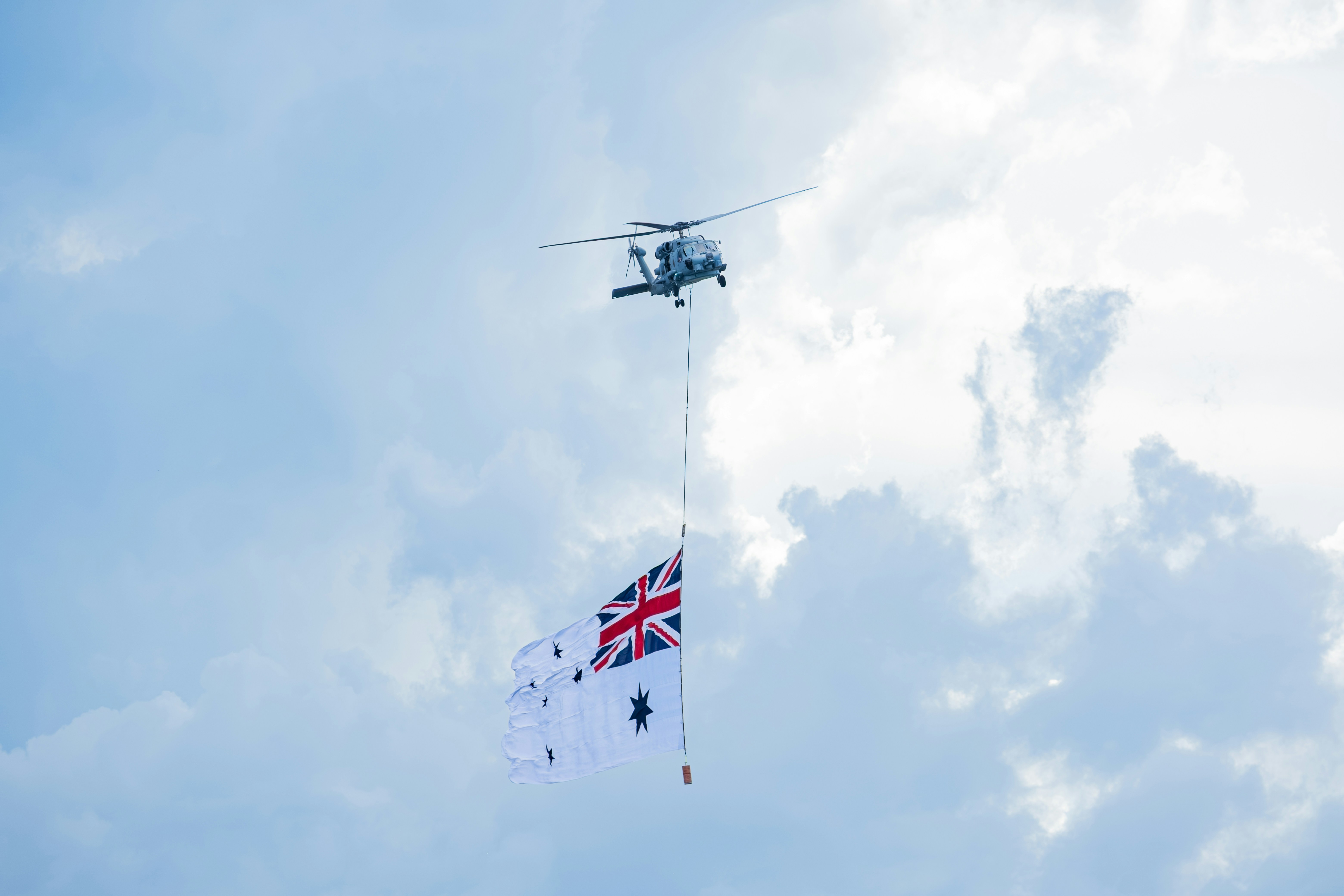 Helicopter Lift: Flag-borne Banner in the Sky