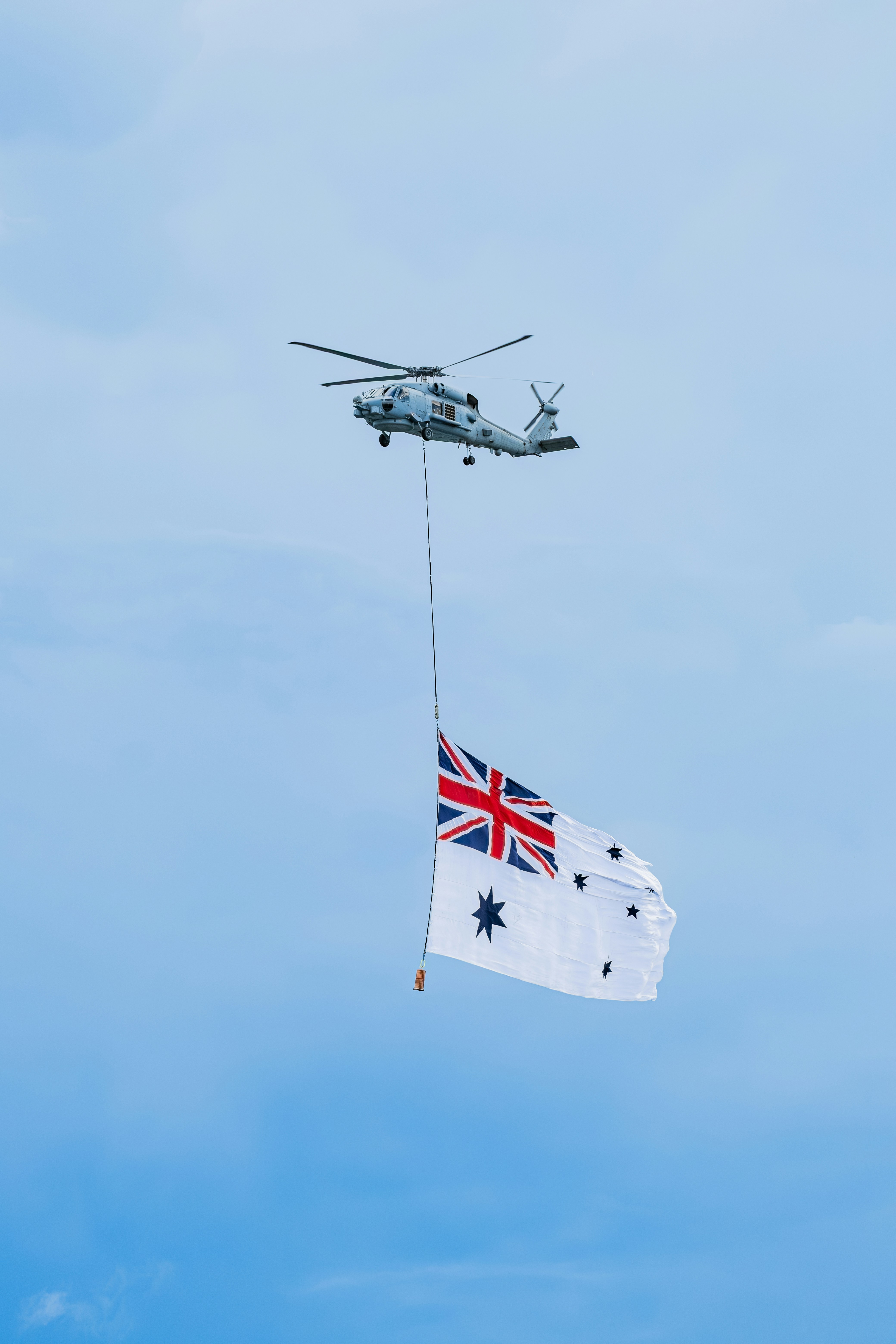 Blue Sky Lift: The Helicopter Sail with the Union Jack Flag