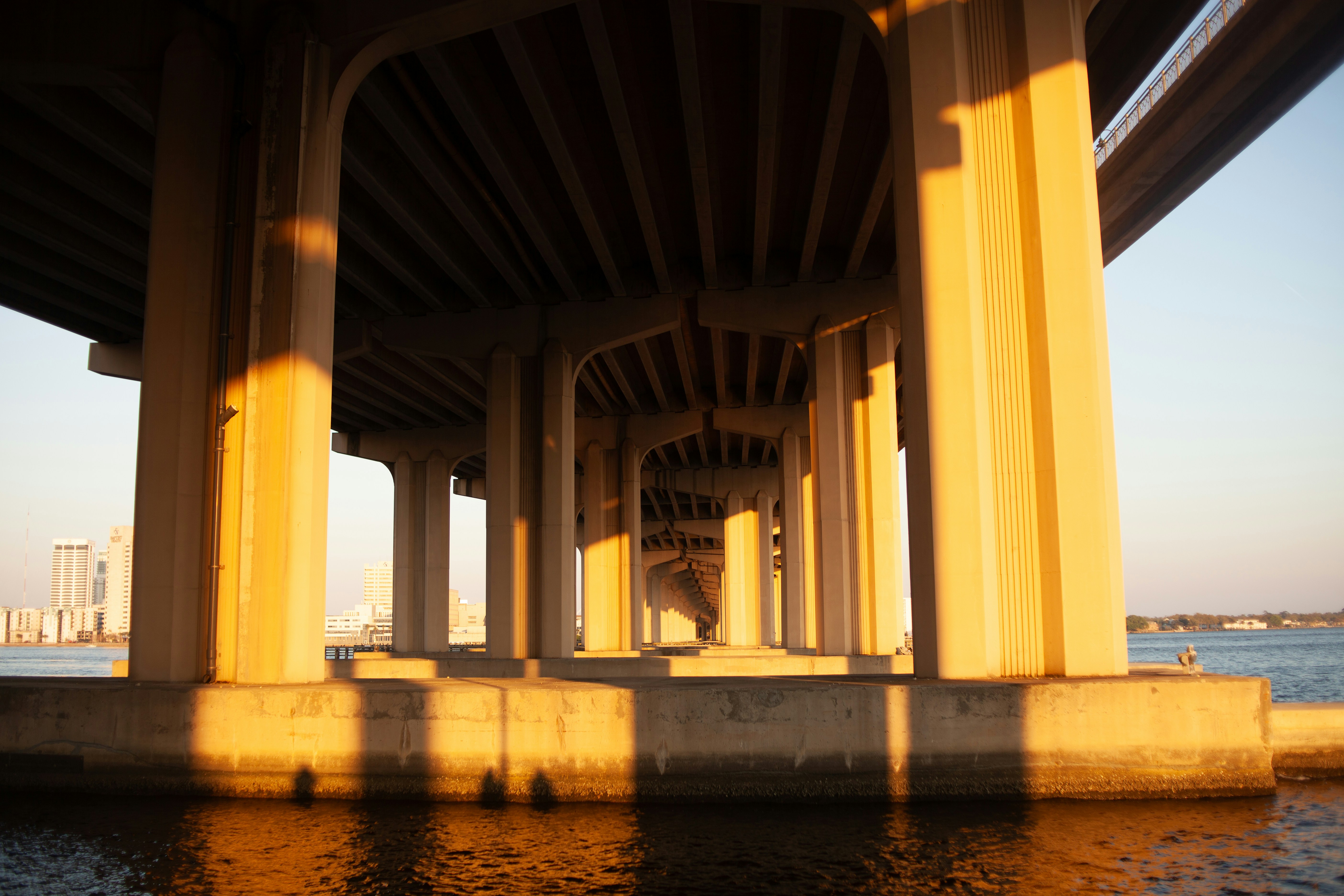 Under the Golden Arches: Morning Light Under the Pier