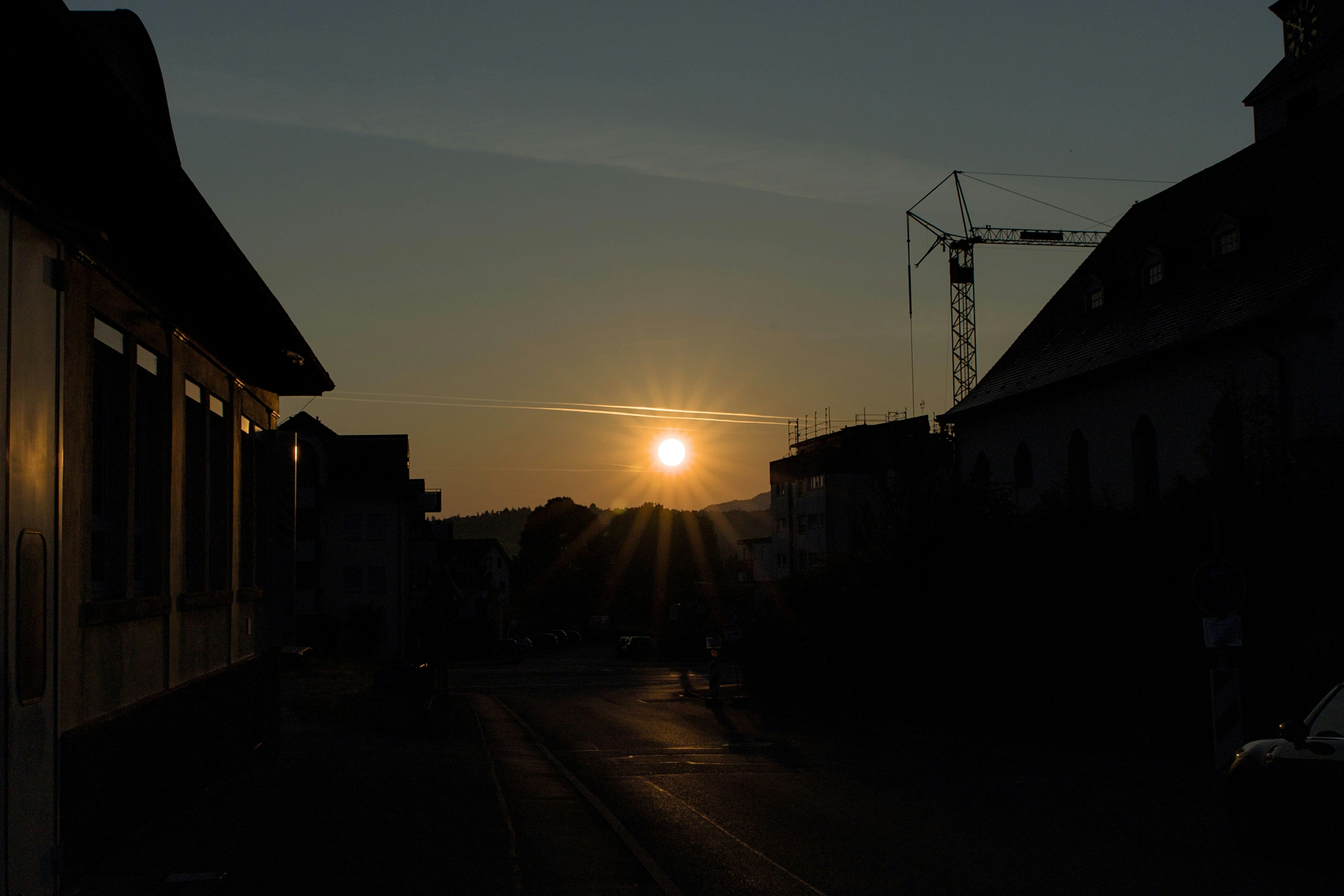 Sunrise over a Quiet Street Amid Construction