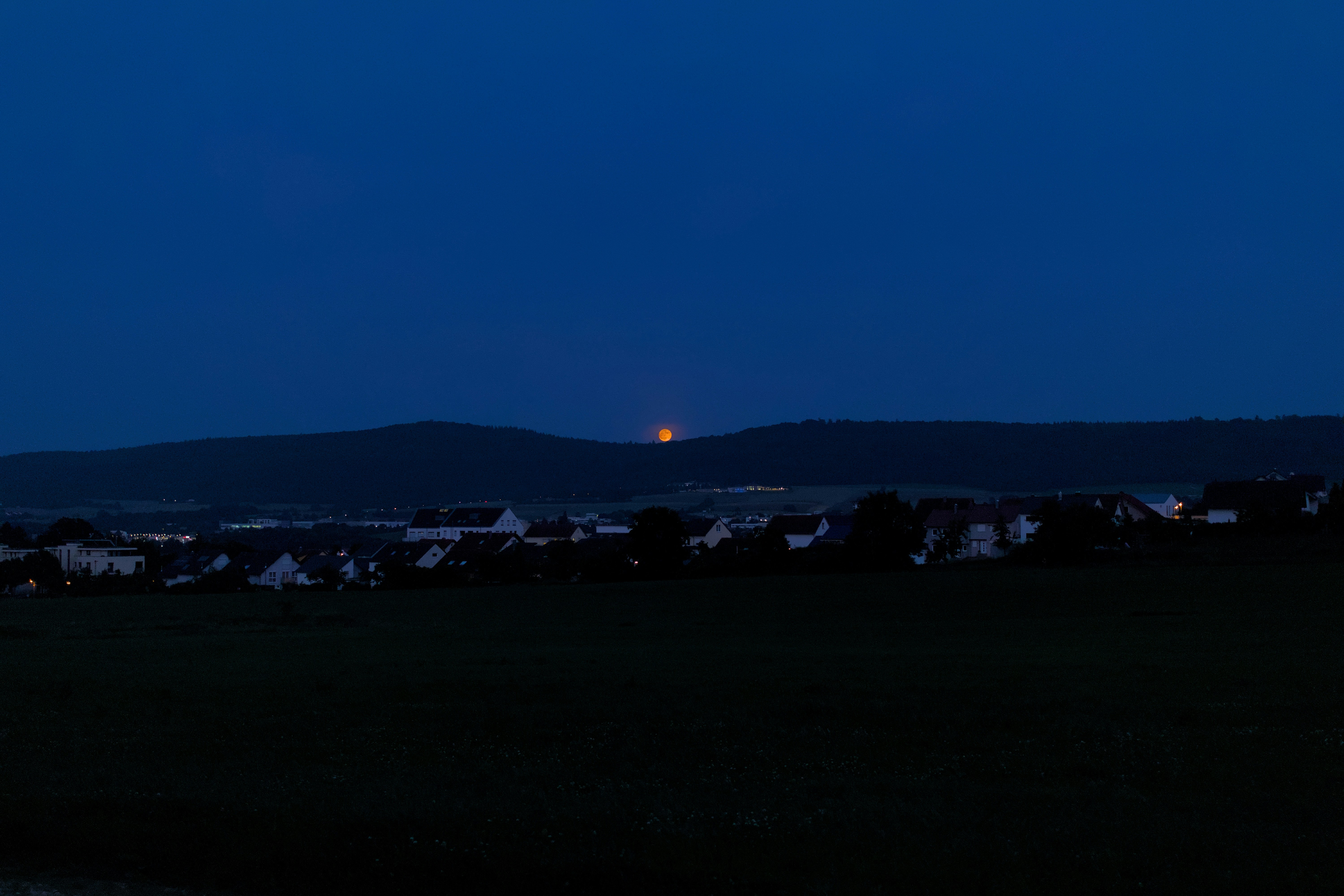 Moonlit Rim Over Quiet Village