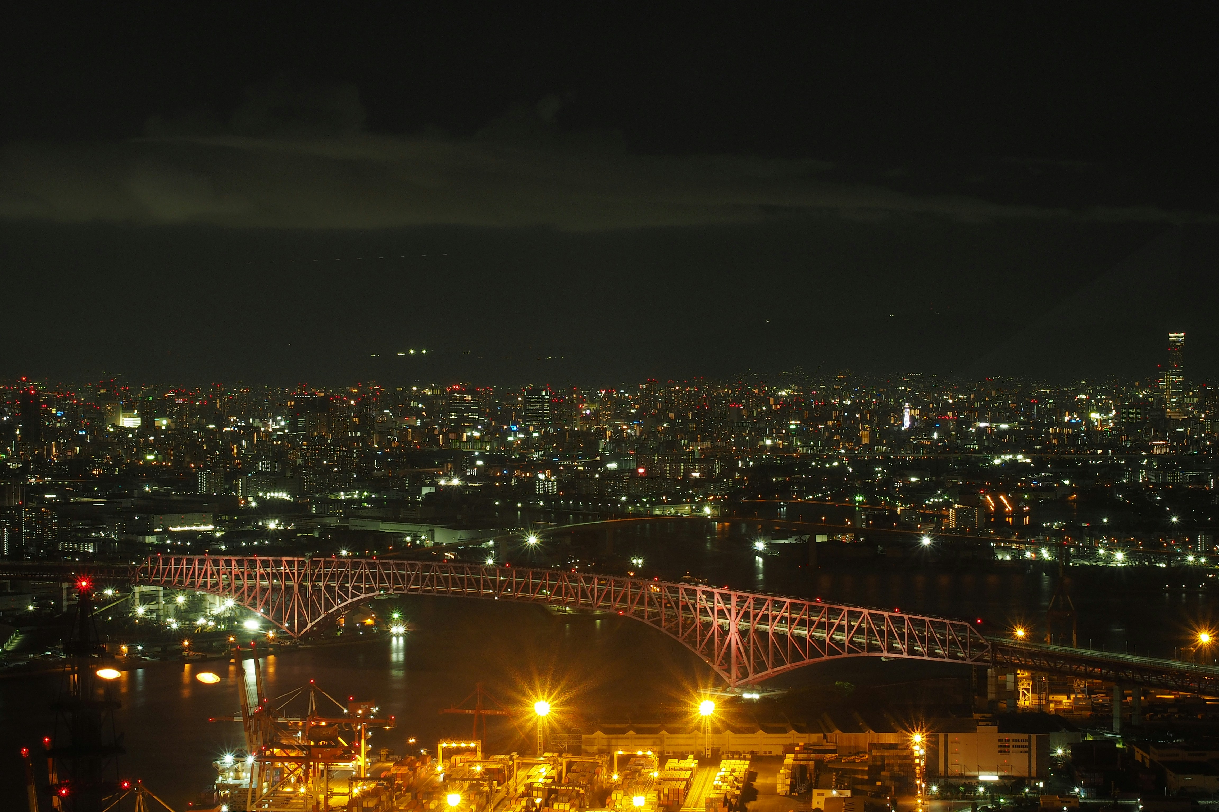 Bridge of Lights over a Quiet Bay: Nighttime Cityscape
