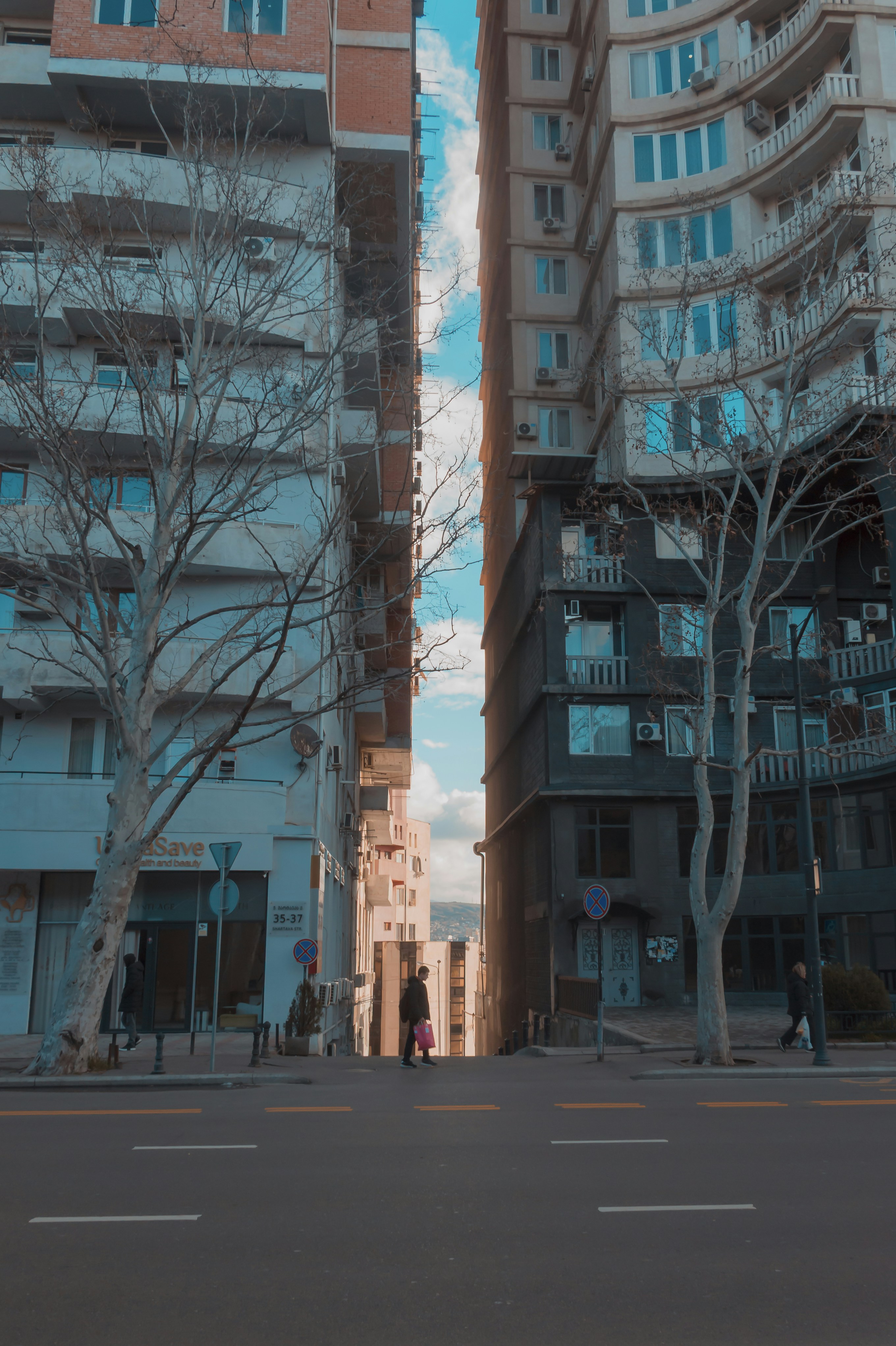 Between Towers: A Quiet Alley Slices the City