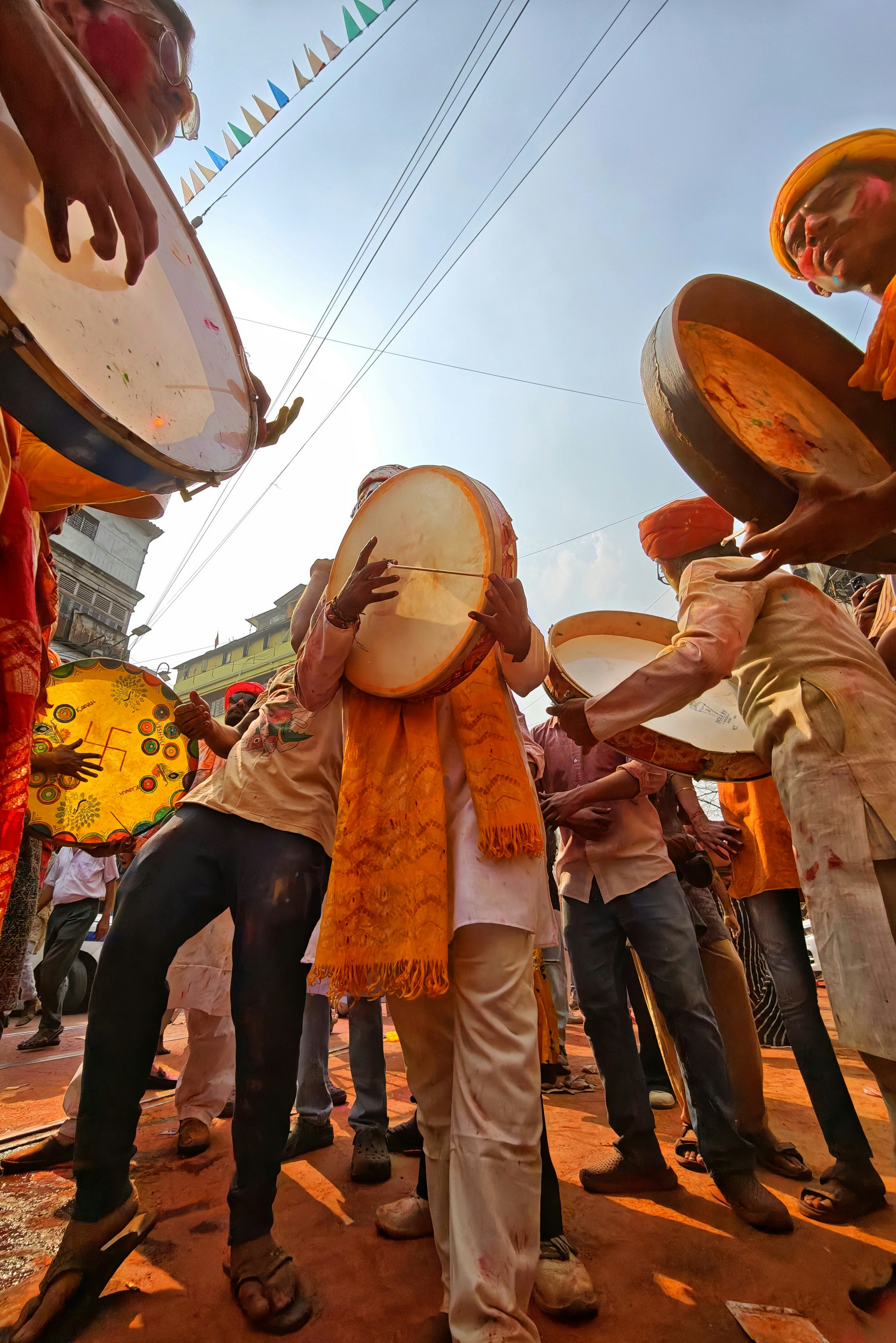 Drummers in the Sun: Color and Motion in a Vibrant Festival Parade