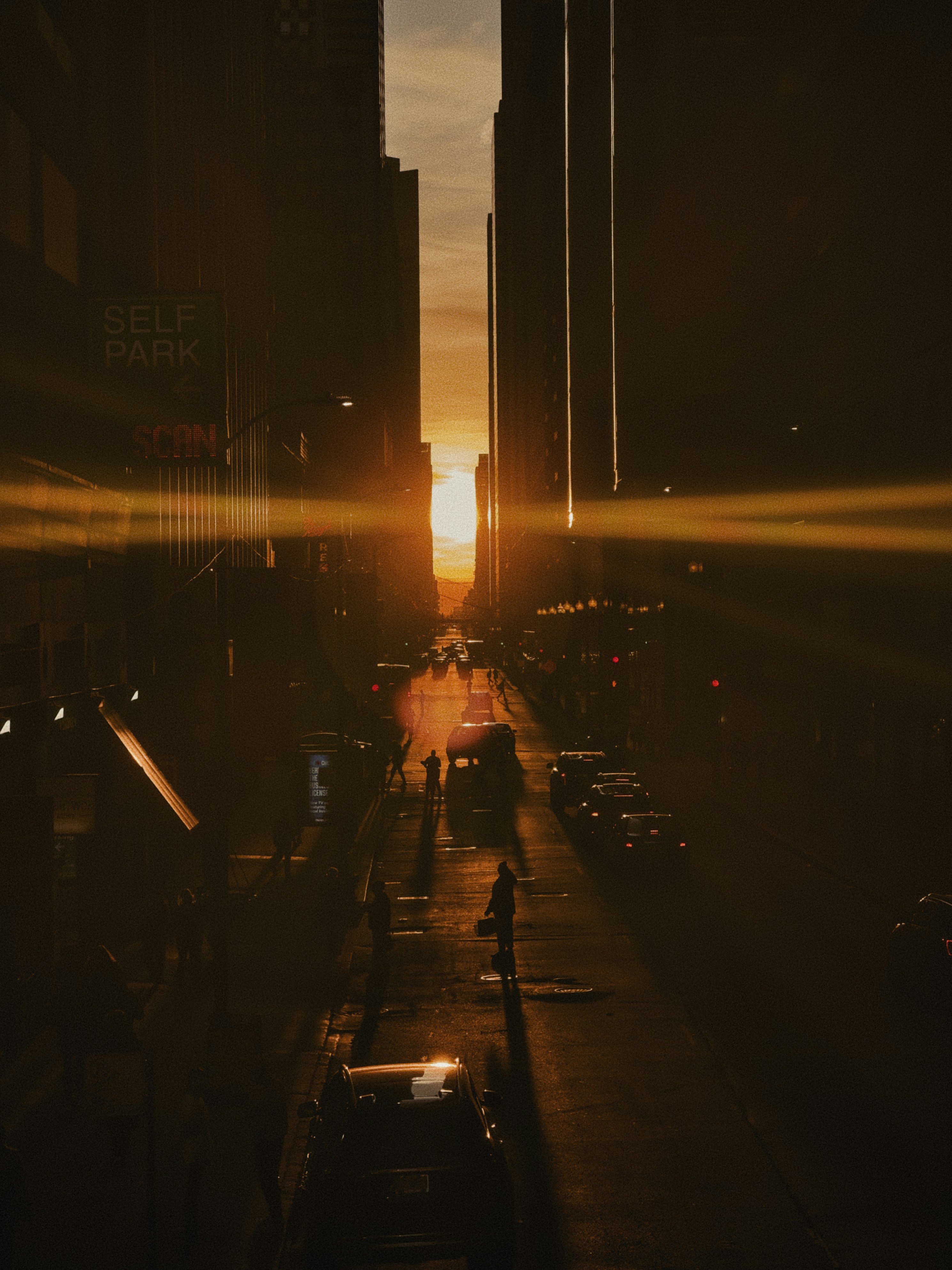 Sunset Relay: City Street Backlit by a Narrow Gap