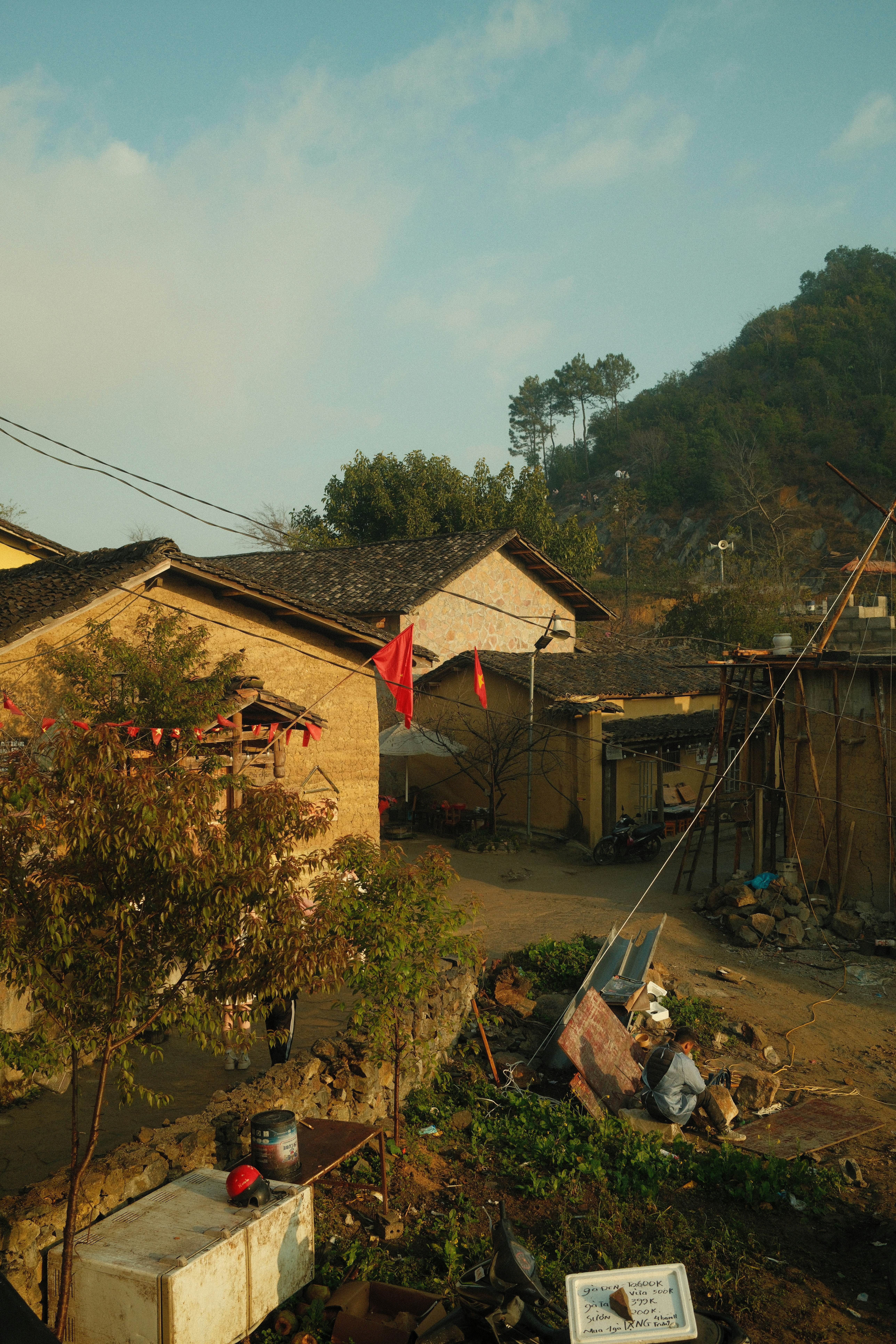 Sunlit Village Square with Sleeping Cyclone of Lines