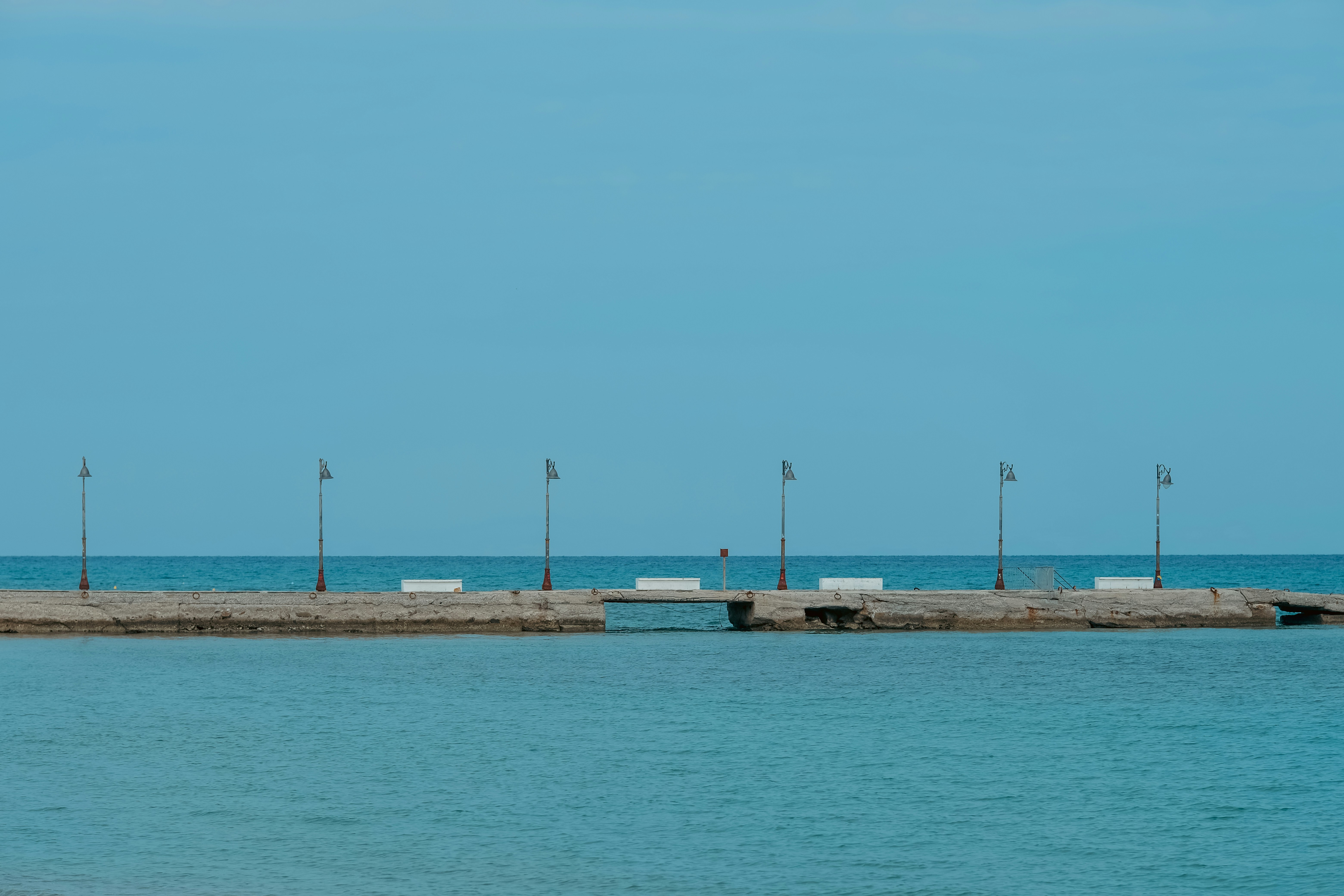 Calm Pier Stretches Toward a Quiet Horizon