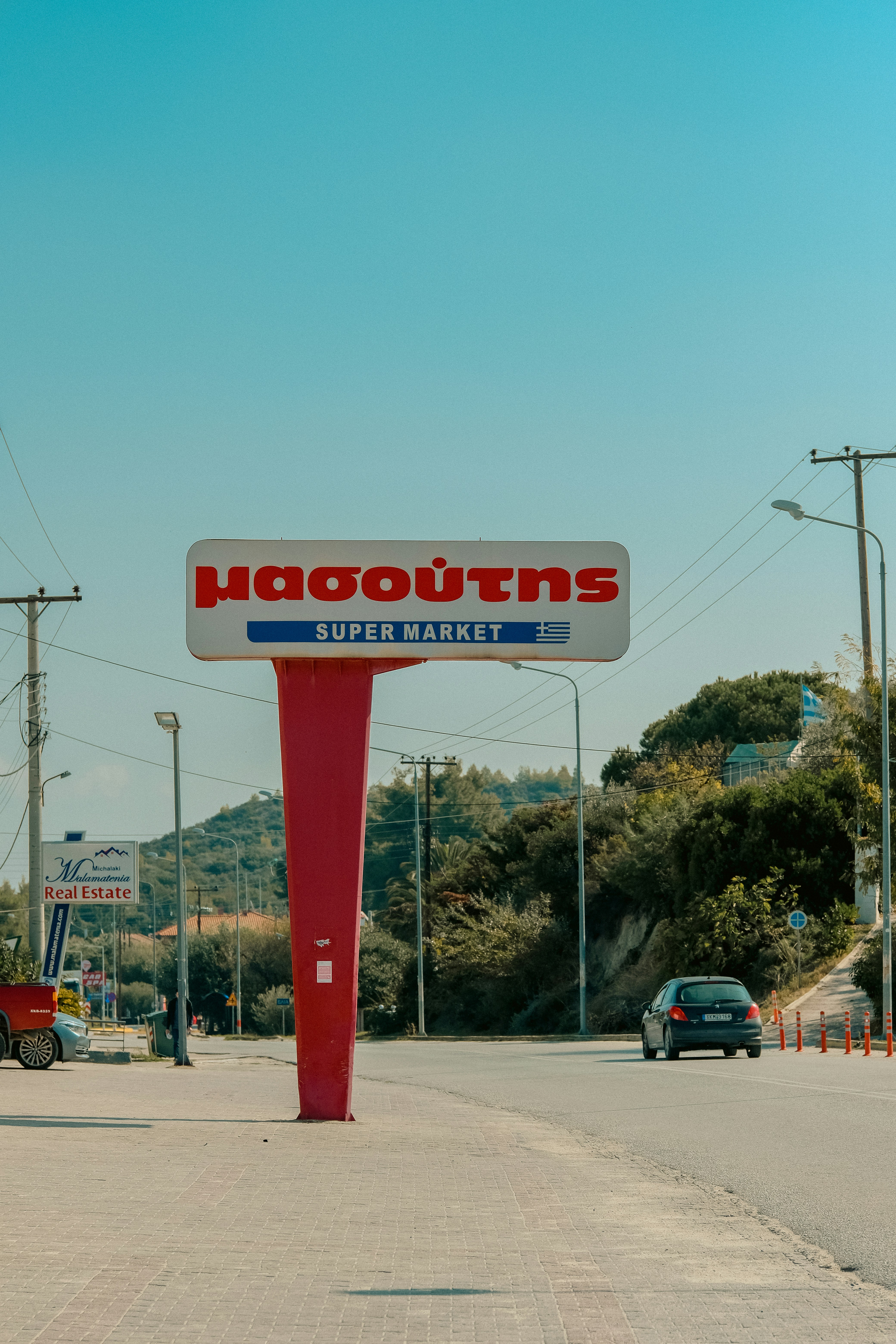 Big Retro Signpost at the Edge of the Road