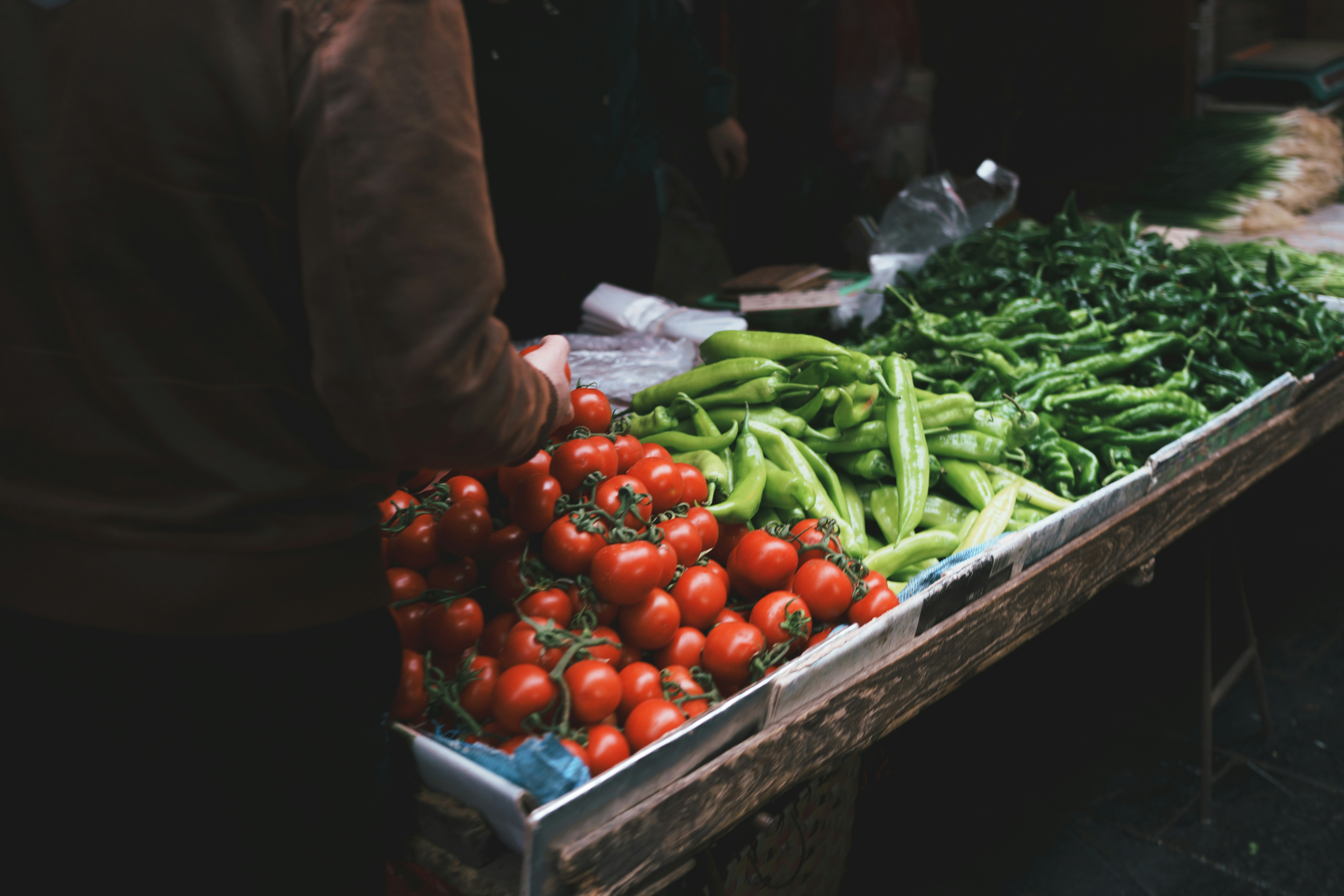 Frame of Reds and Greens: Market Stall at Dusk