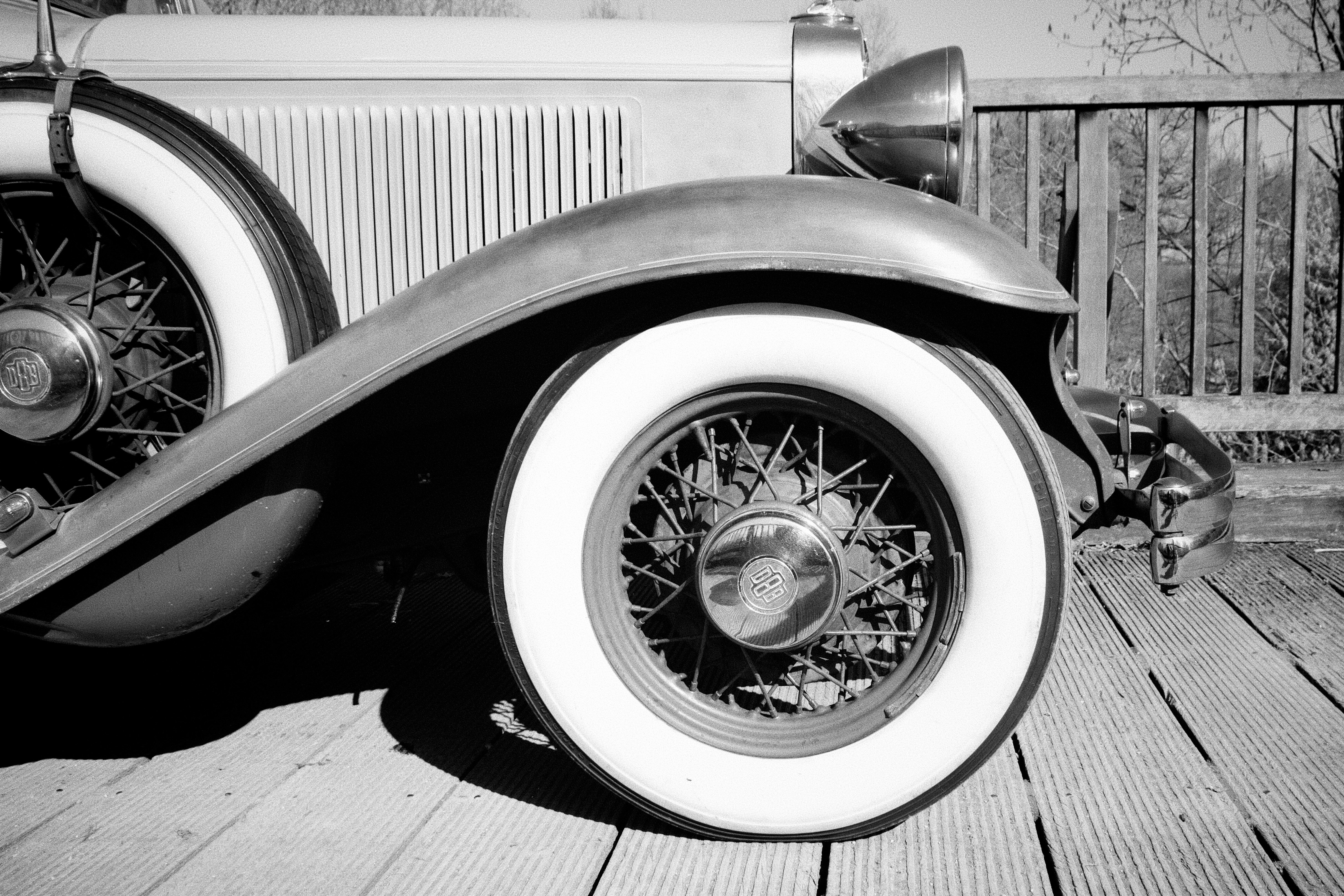 Classic Car Wheel with Whitewall and Spoked Rim in Monochrome Frame