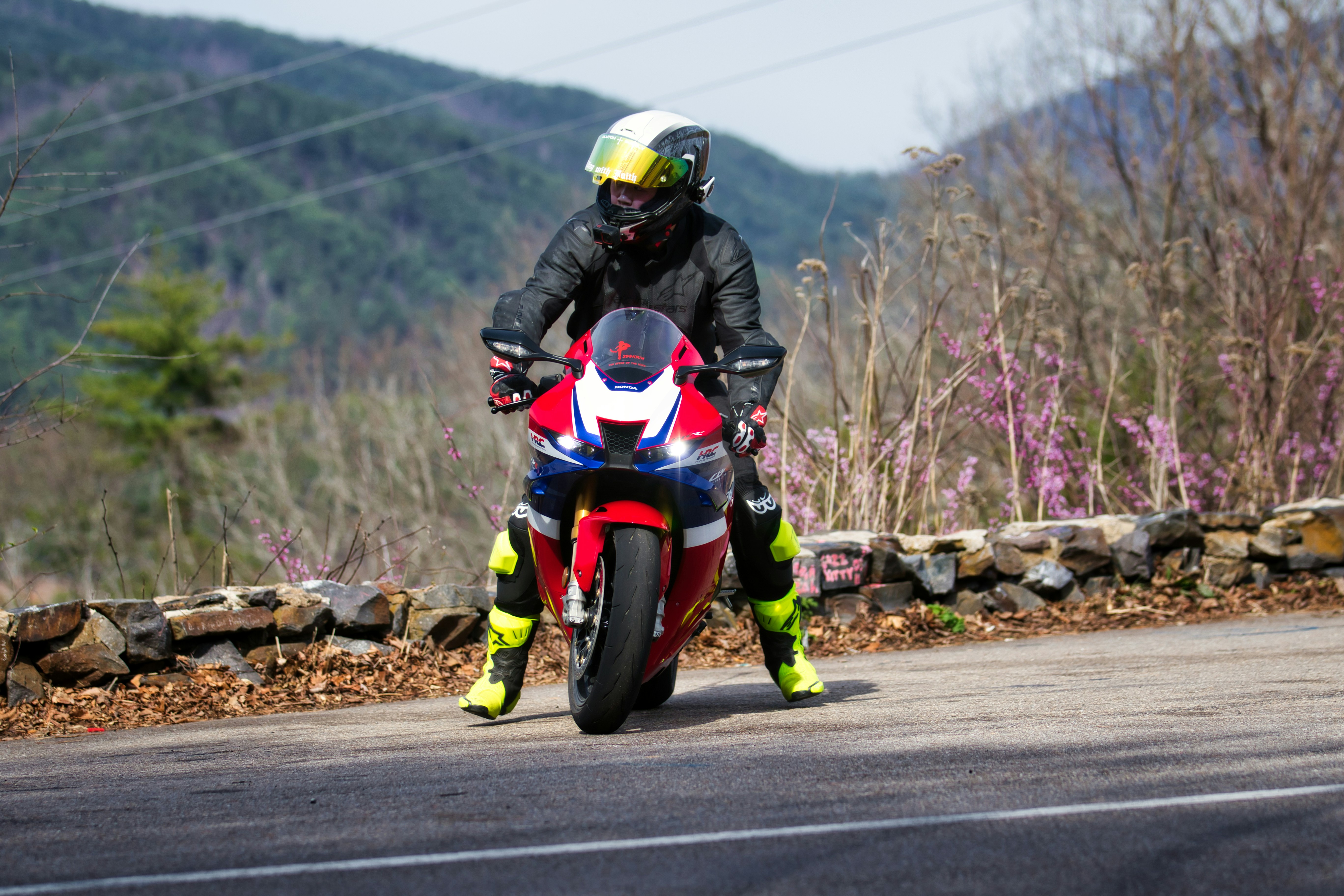 Rider in Focus: Precision on a Narrow Canyon Road