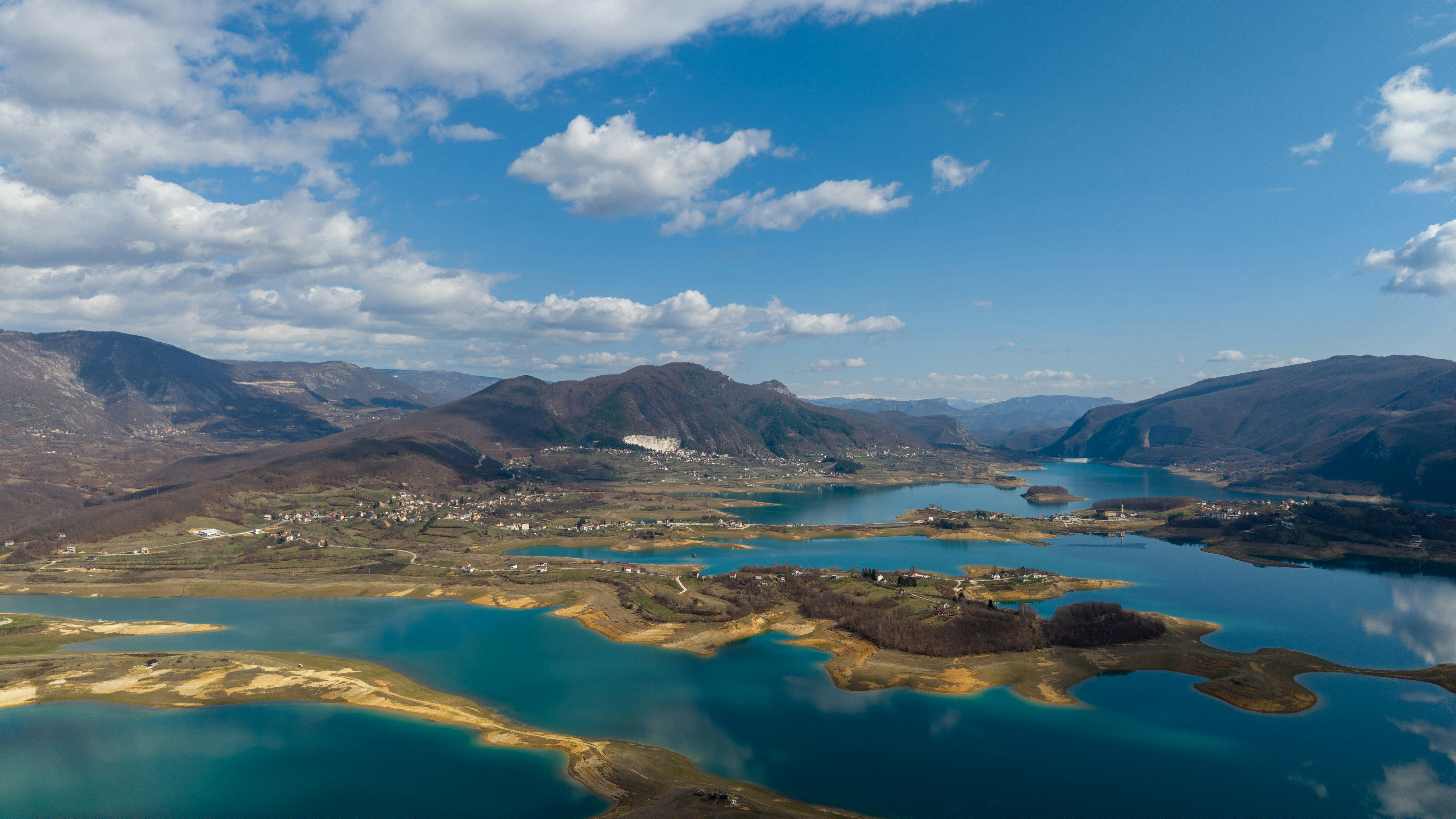 Azure Valleys: Aerial Glimmers Over a Serene Reservoir Network