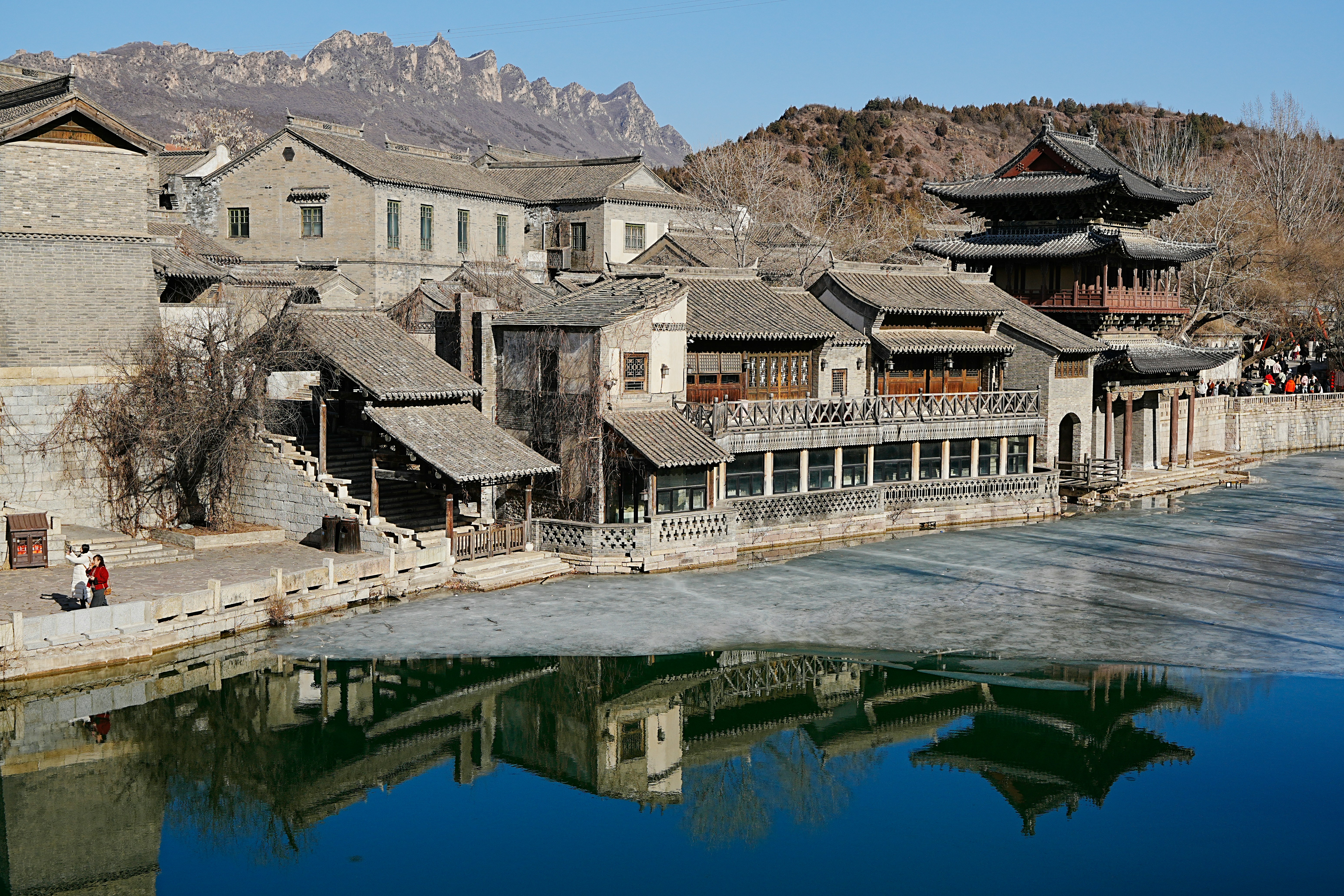 Waterfront Temple Rows: Reflections Along a Historic Chinese Alley