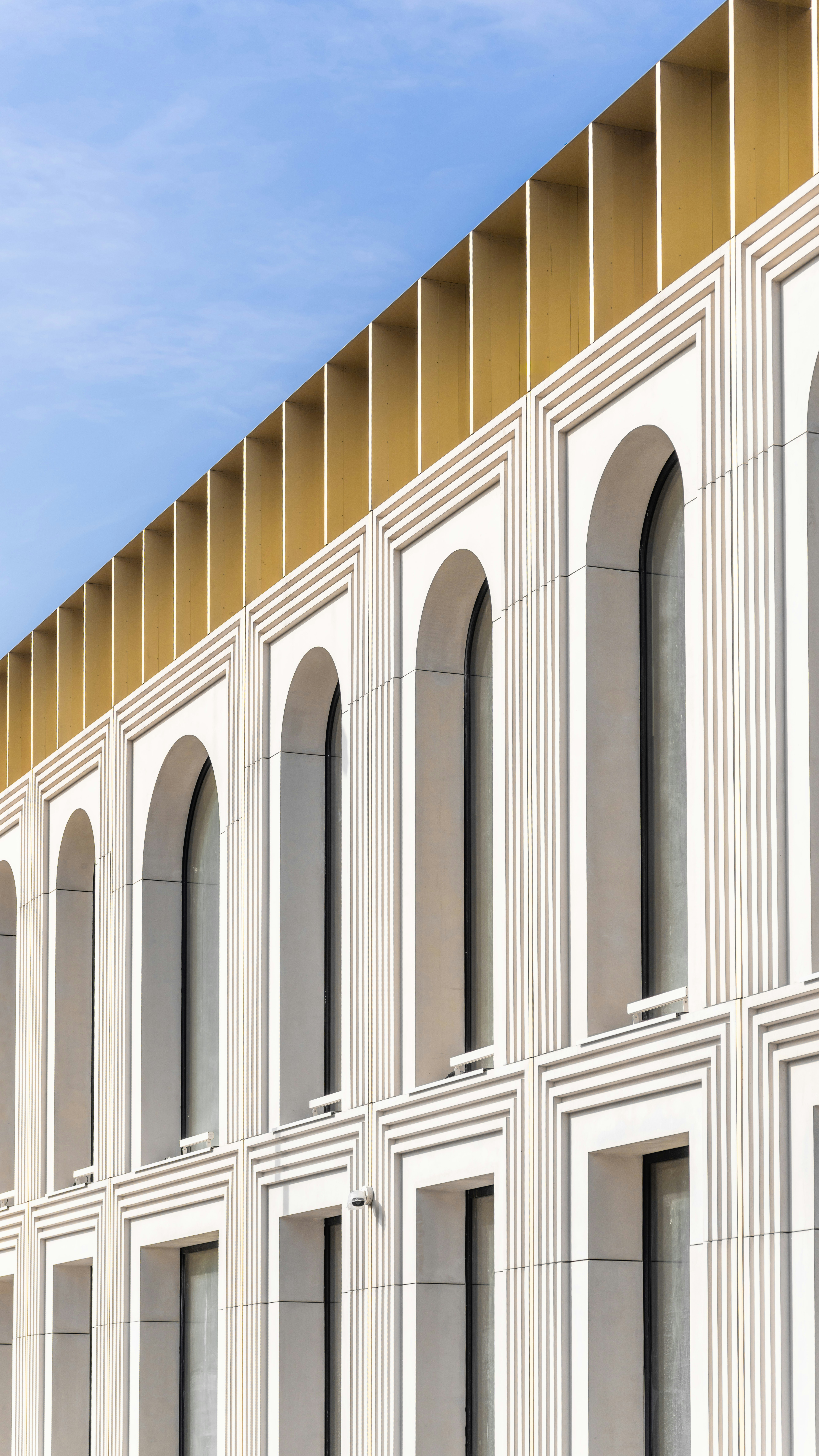 Vertical Arches under a Golden Ribbon