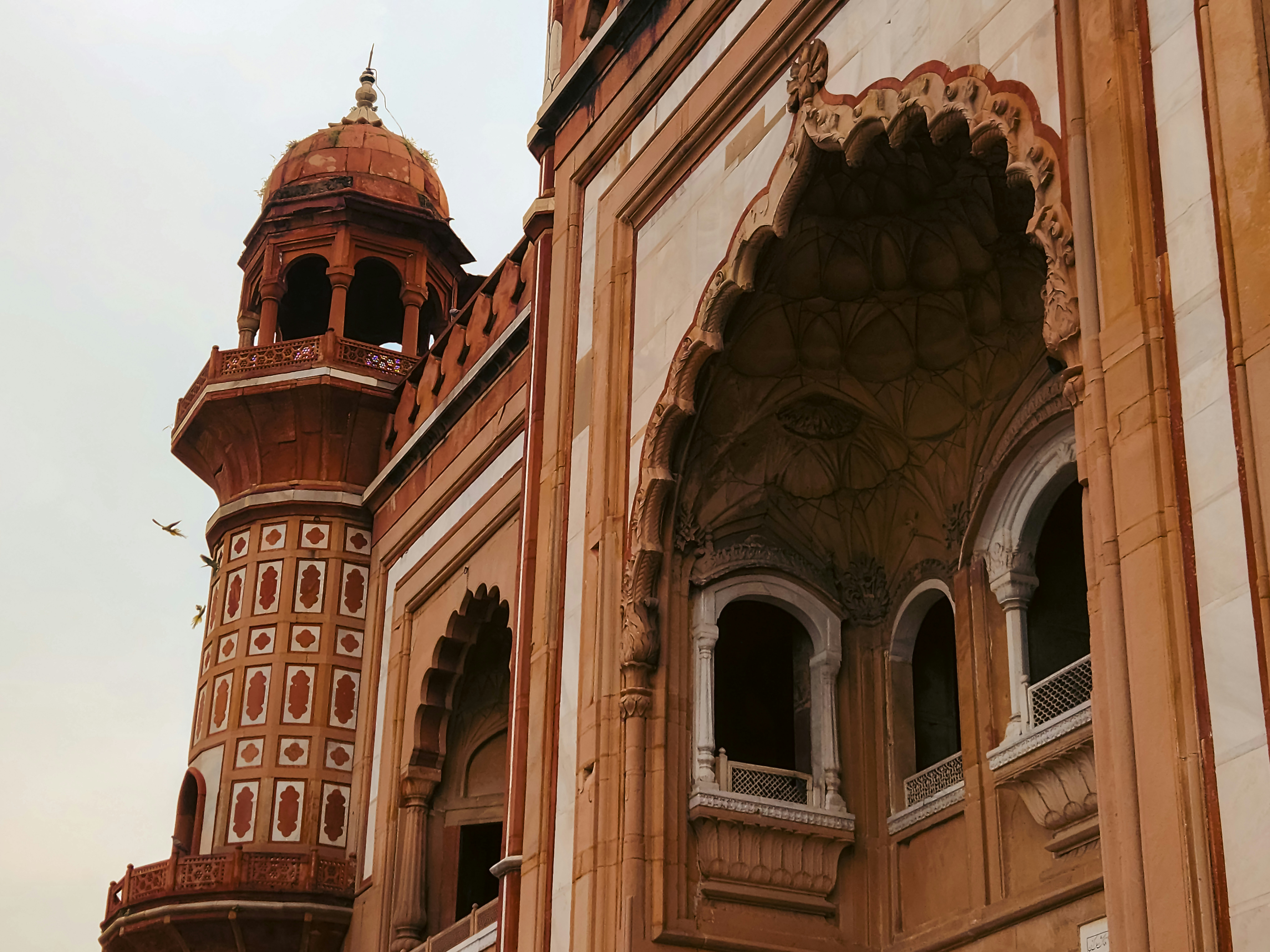 Ornate Tower and Archway: Rajasthan Architecture in Focus