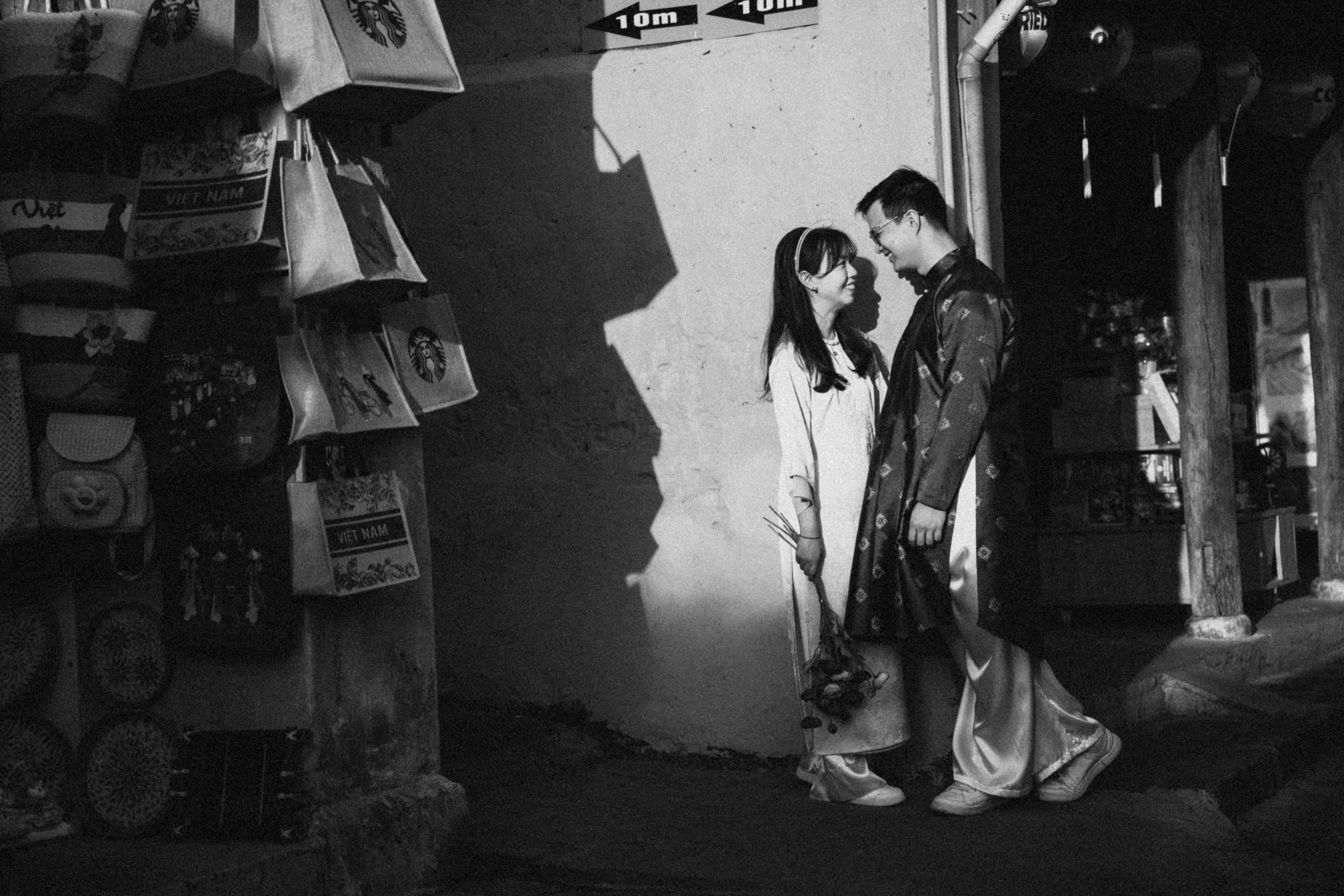Moonlit Street Embrace: A Quiet Moment Between Strangers