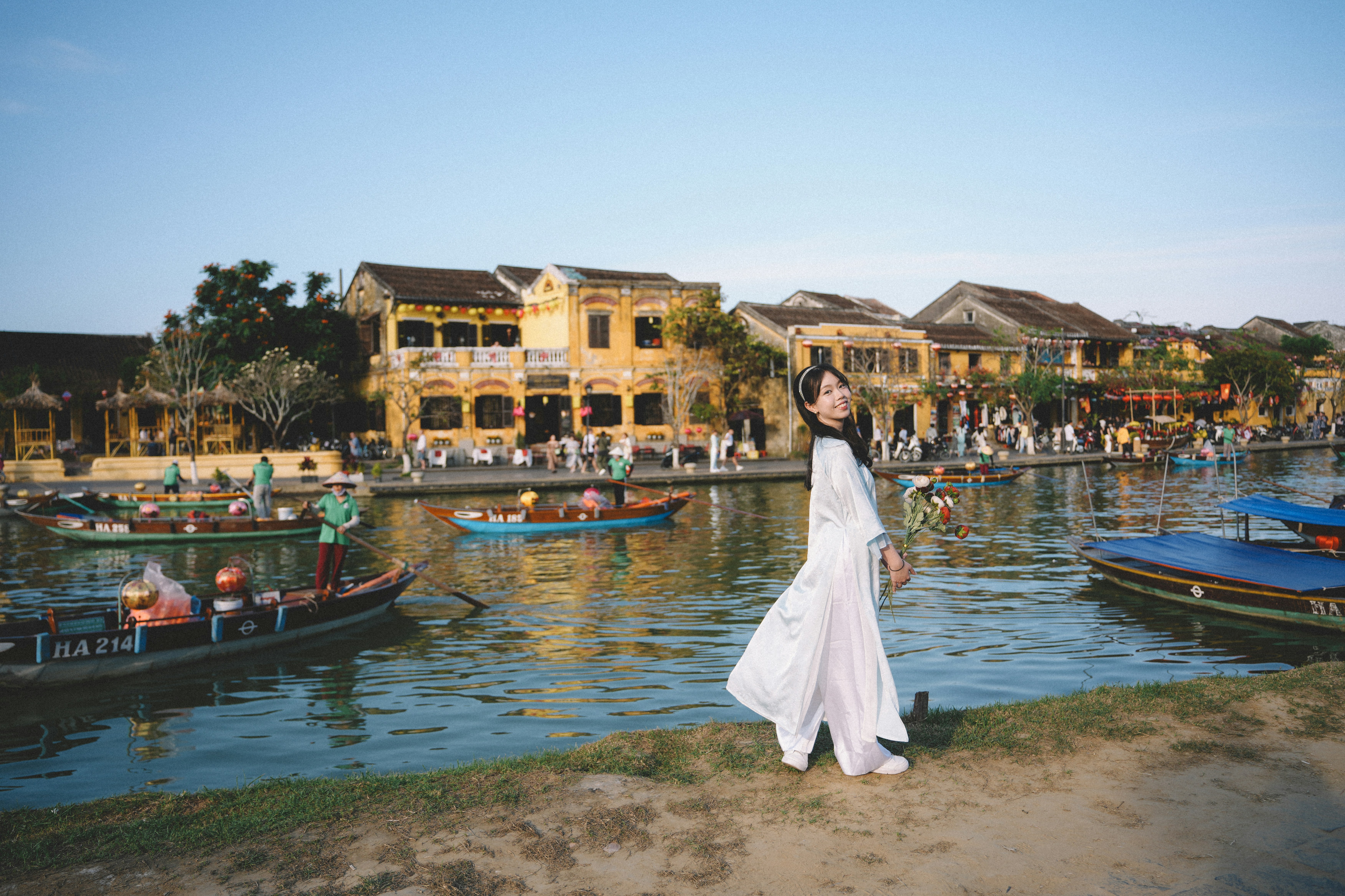 White-dress Wanderer by the Riverside Bazaar