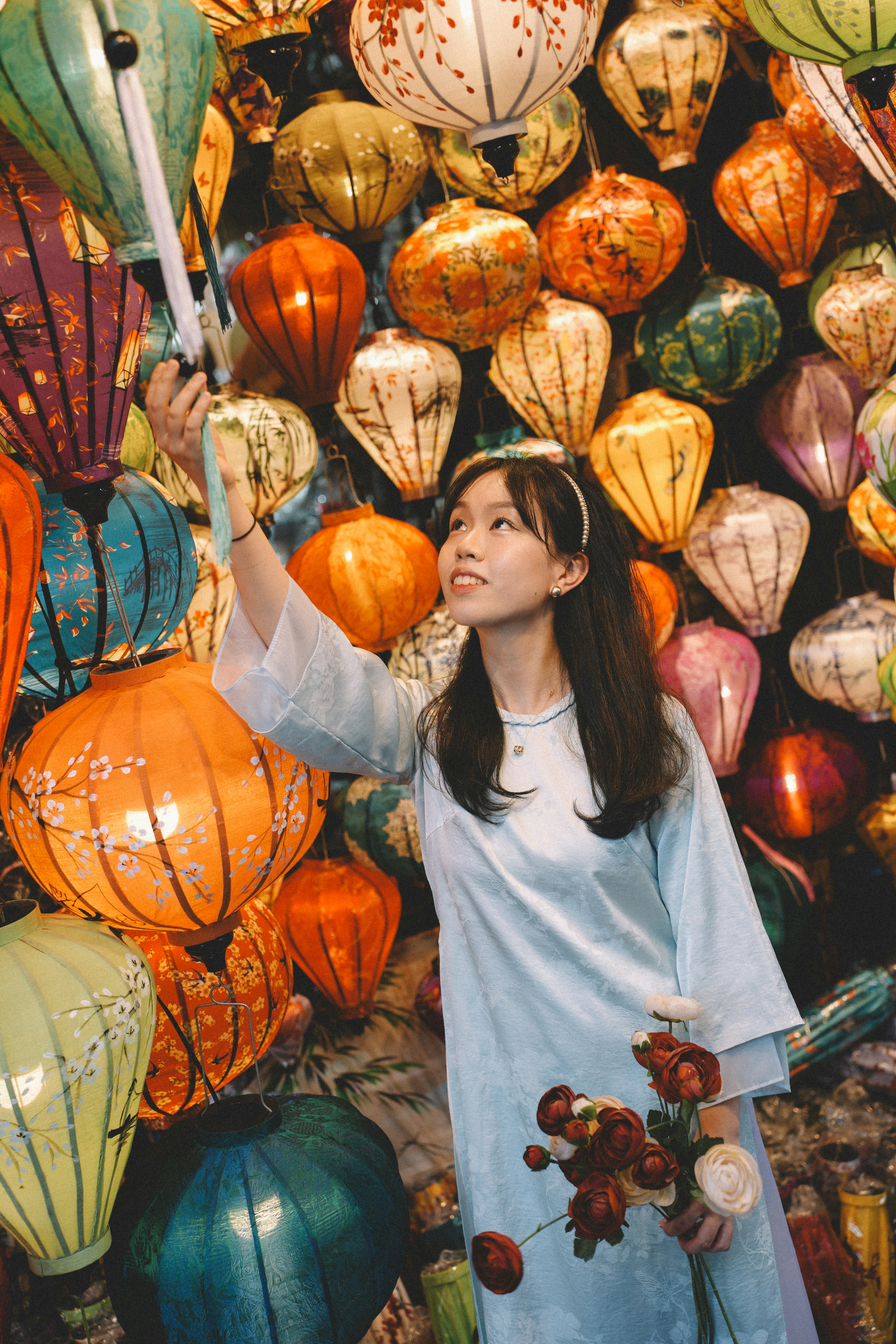 Floating Orbs and a Softer Smile: A Portrait Among Lanterns