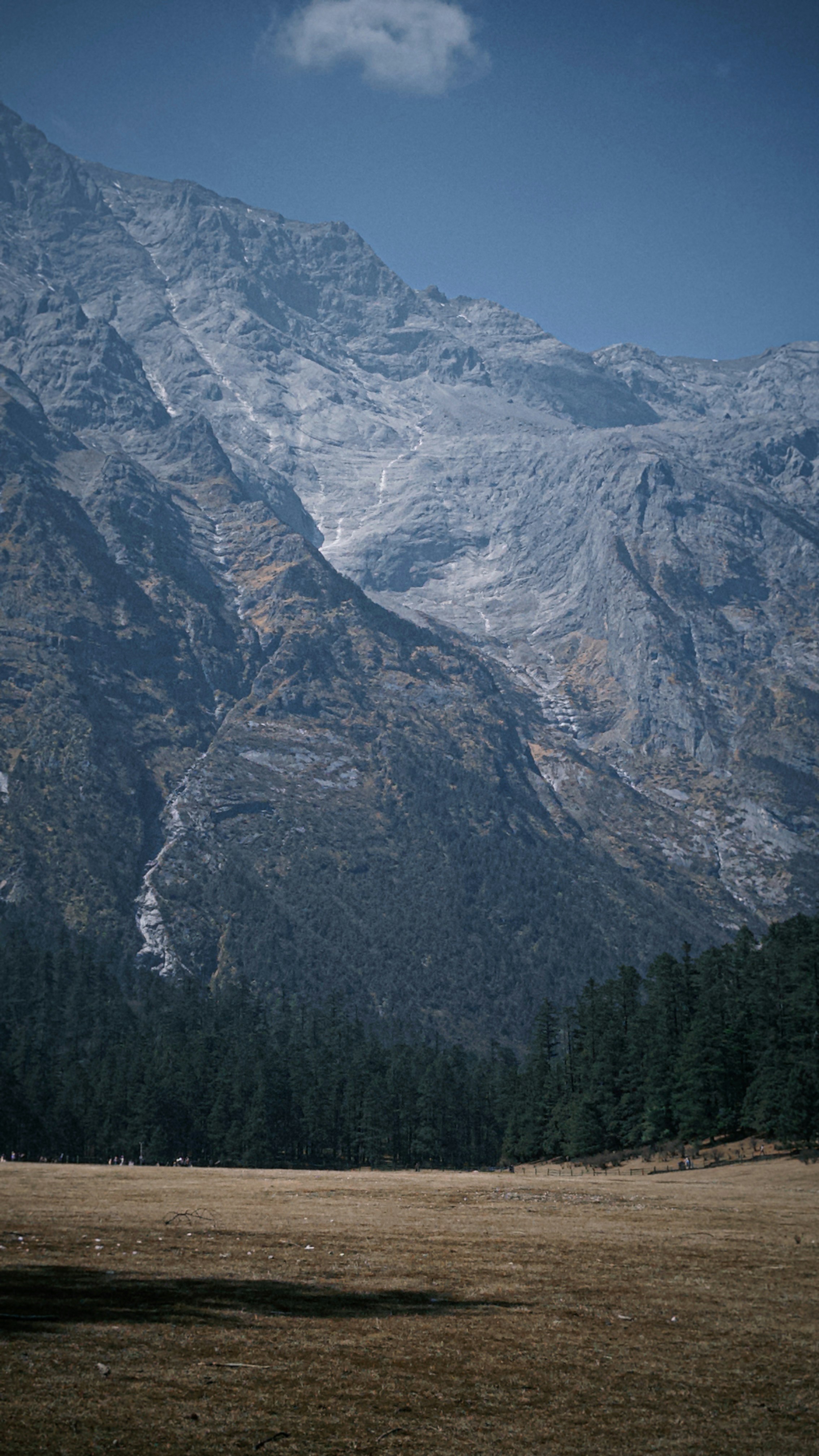 Majestic Mountain Amphitheater Beneath a Clear Blue Sky
