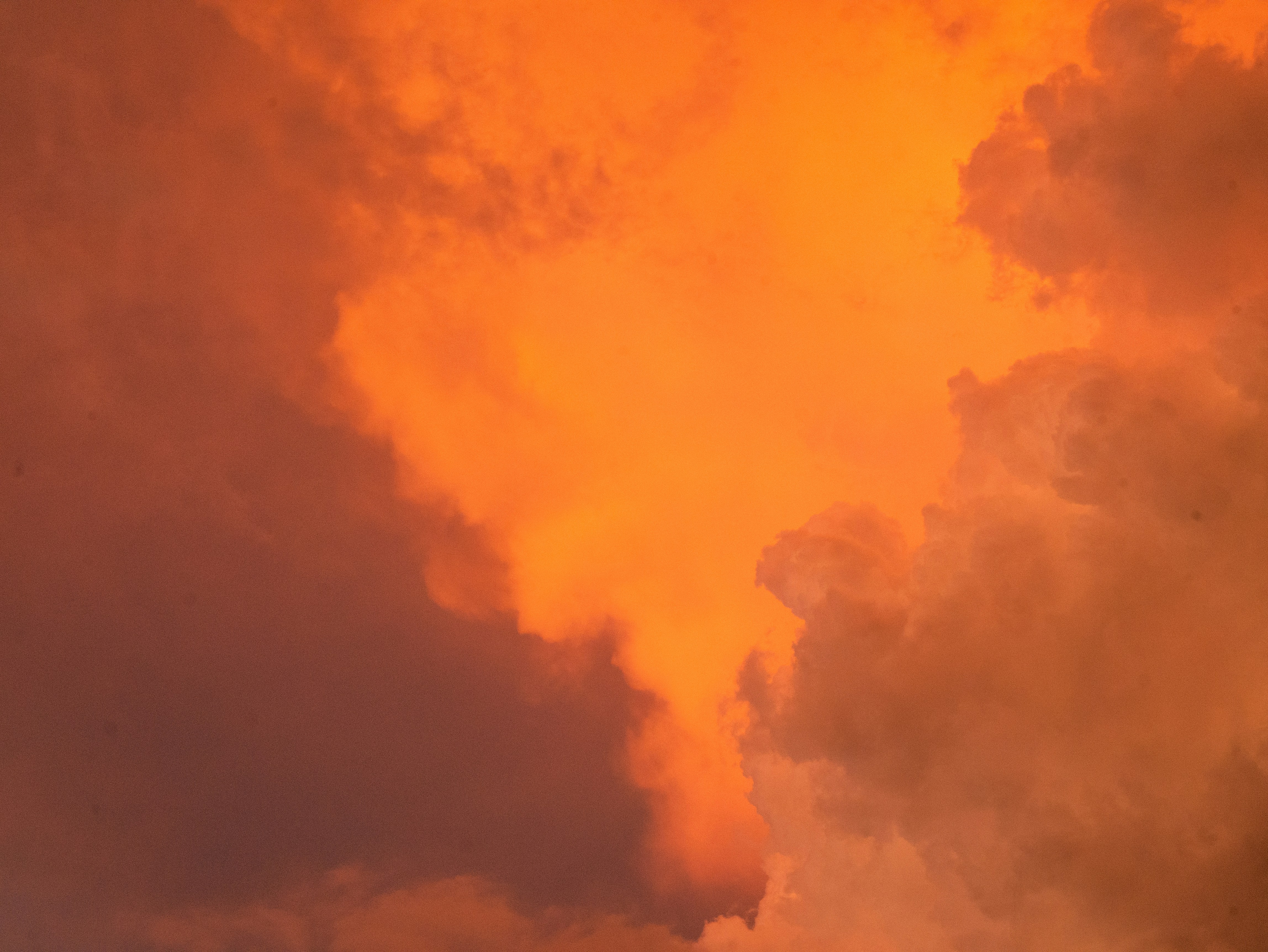 Inferno in the Sky: A Vivid Cloudscape at Dusk