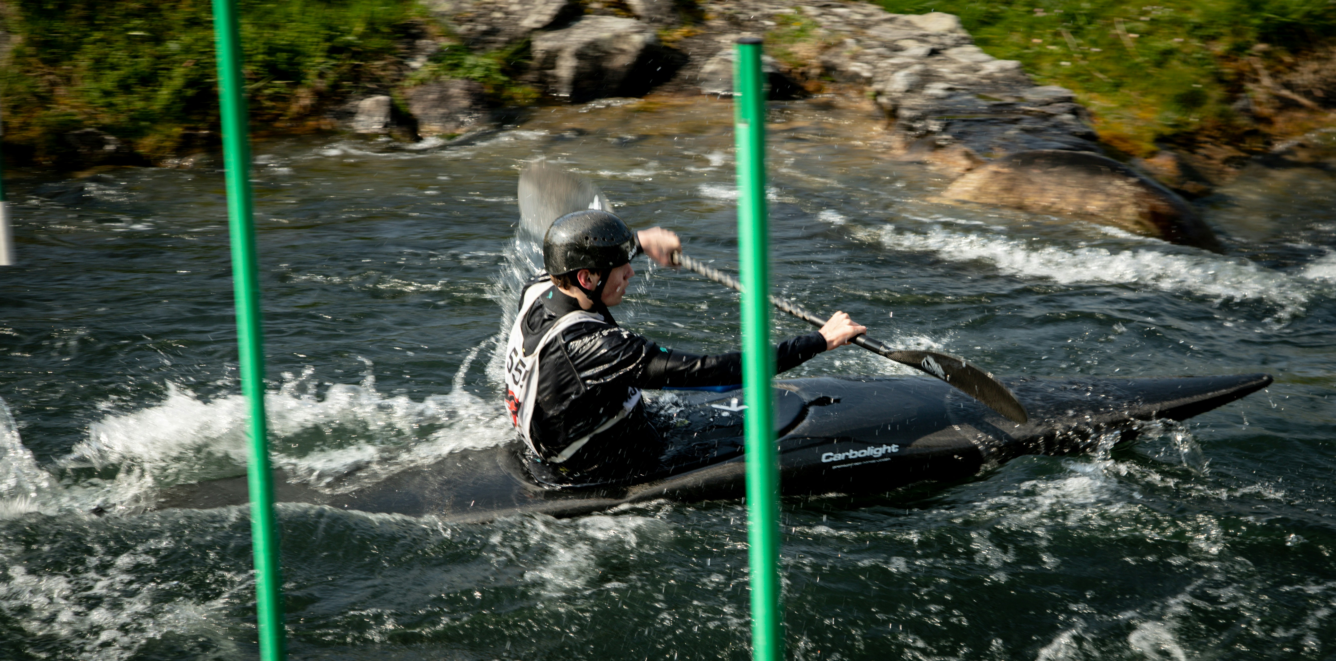 Rapid Rodeo: The Kayaker Carving Through Whitewater