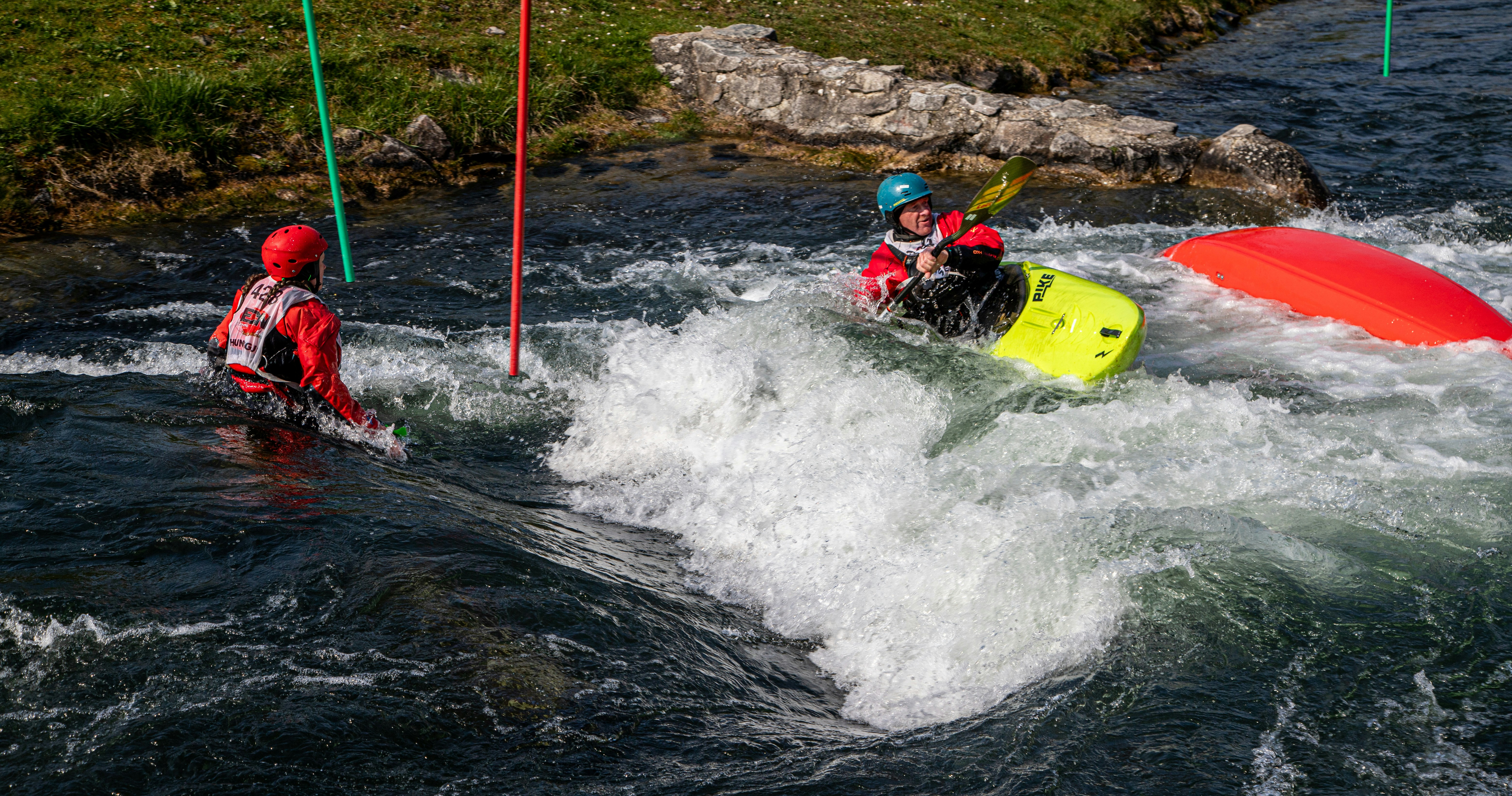 River Rush: Kayakers Battle the Whitewater Gradient