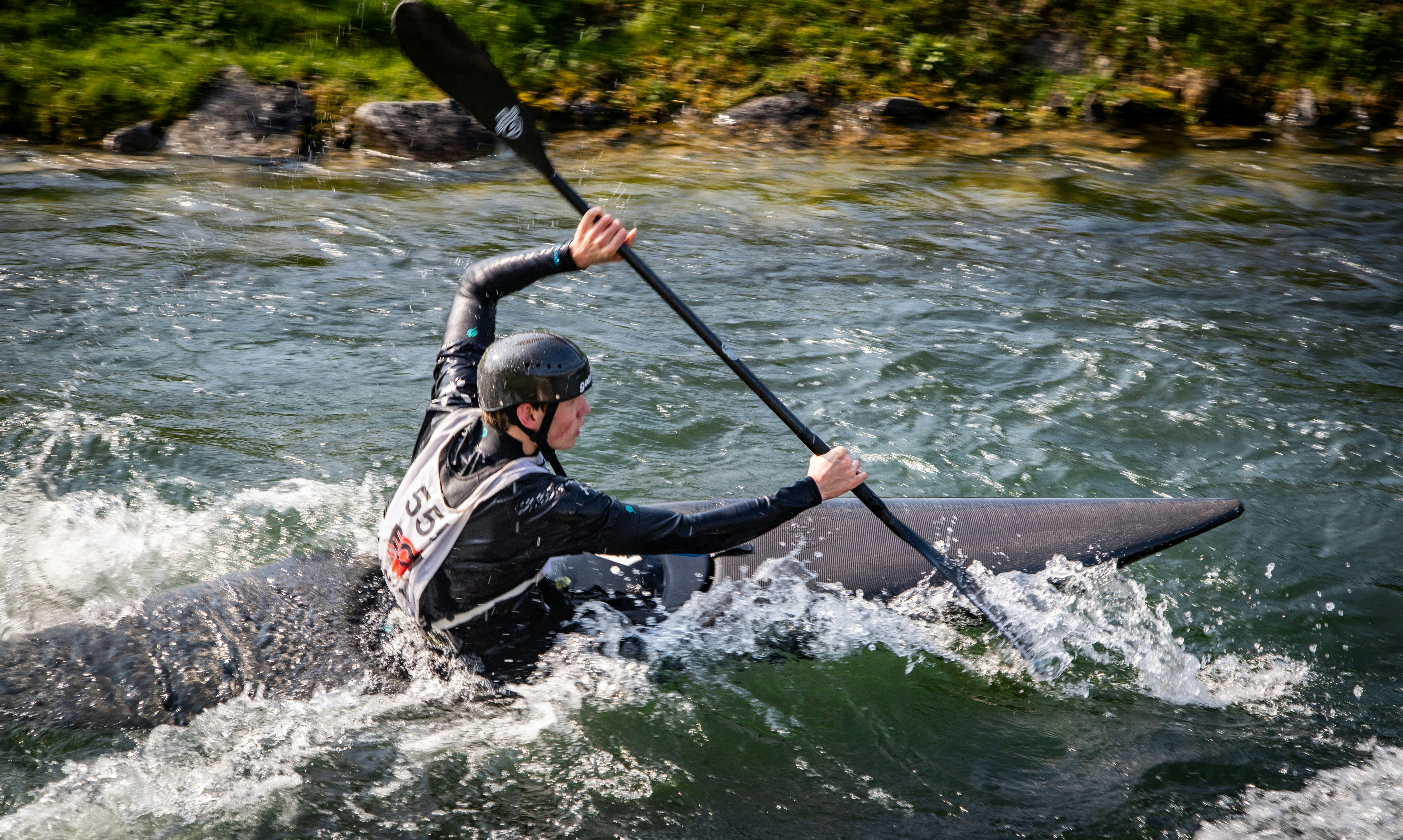 Raging Whitewater Racer: A Kayaker Conquers the Rapids