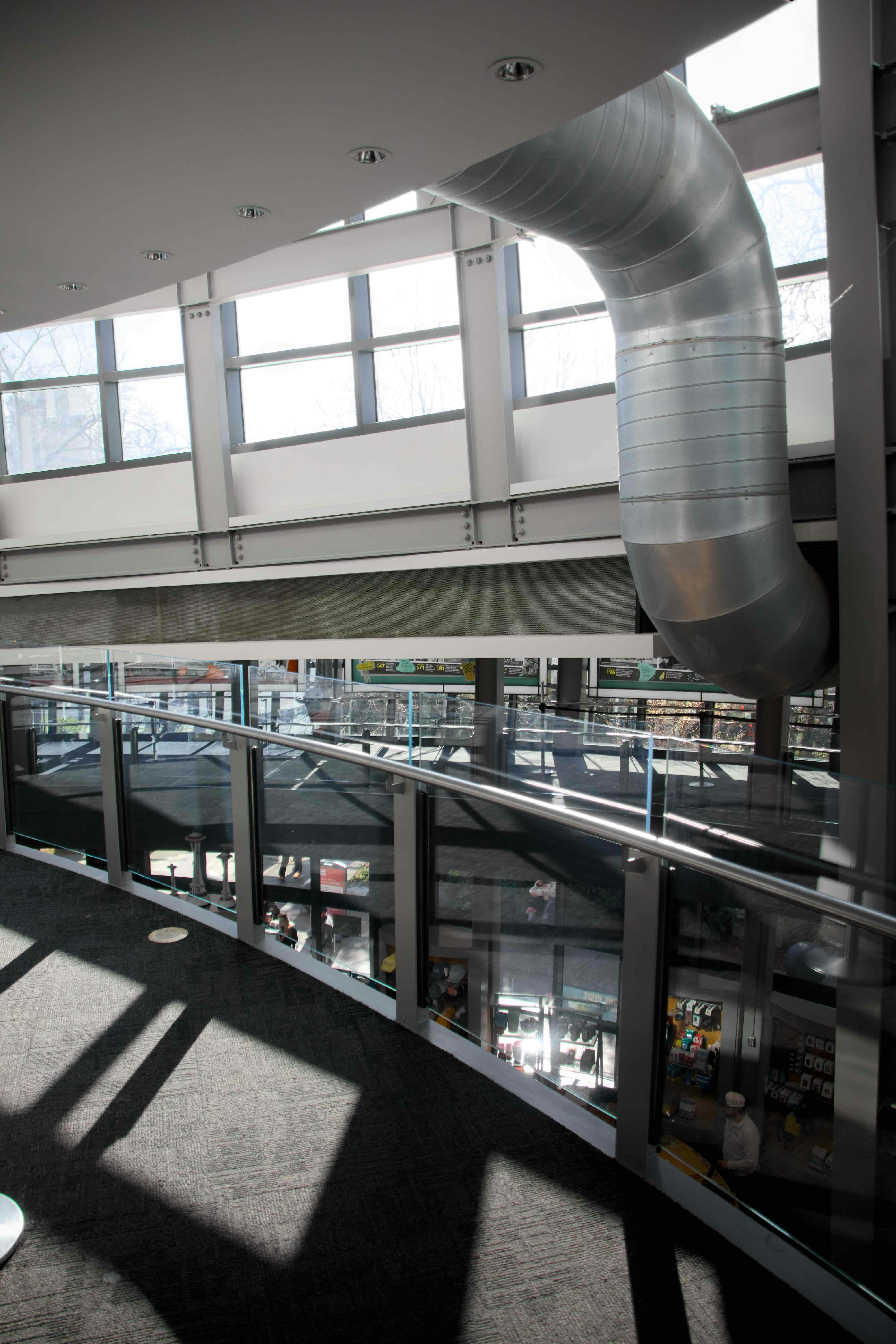 Industrial Atrium: Light, Shadow and a Curved Duct