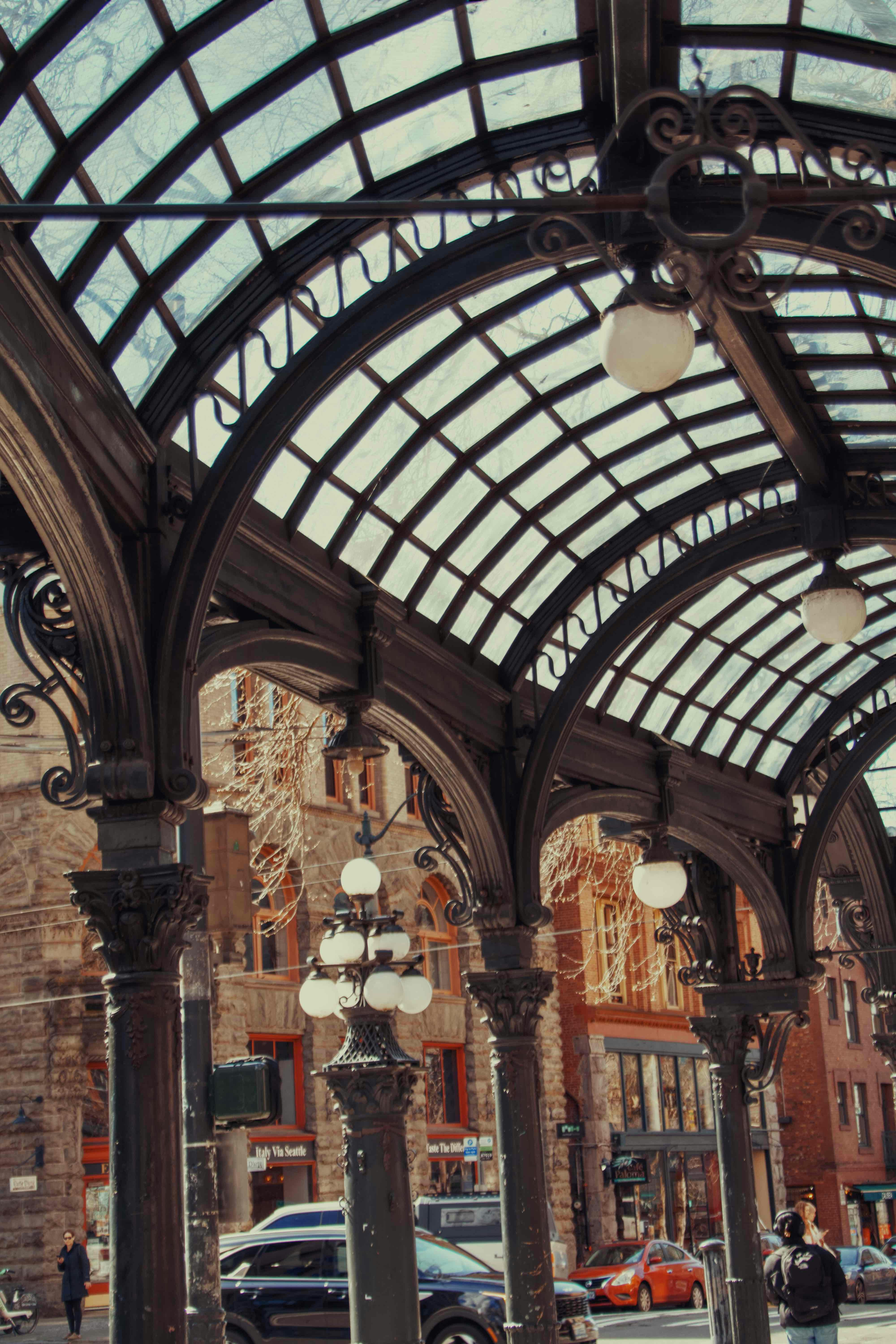 Ornate Glass Canopy Over Quiet City Street