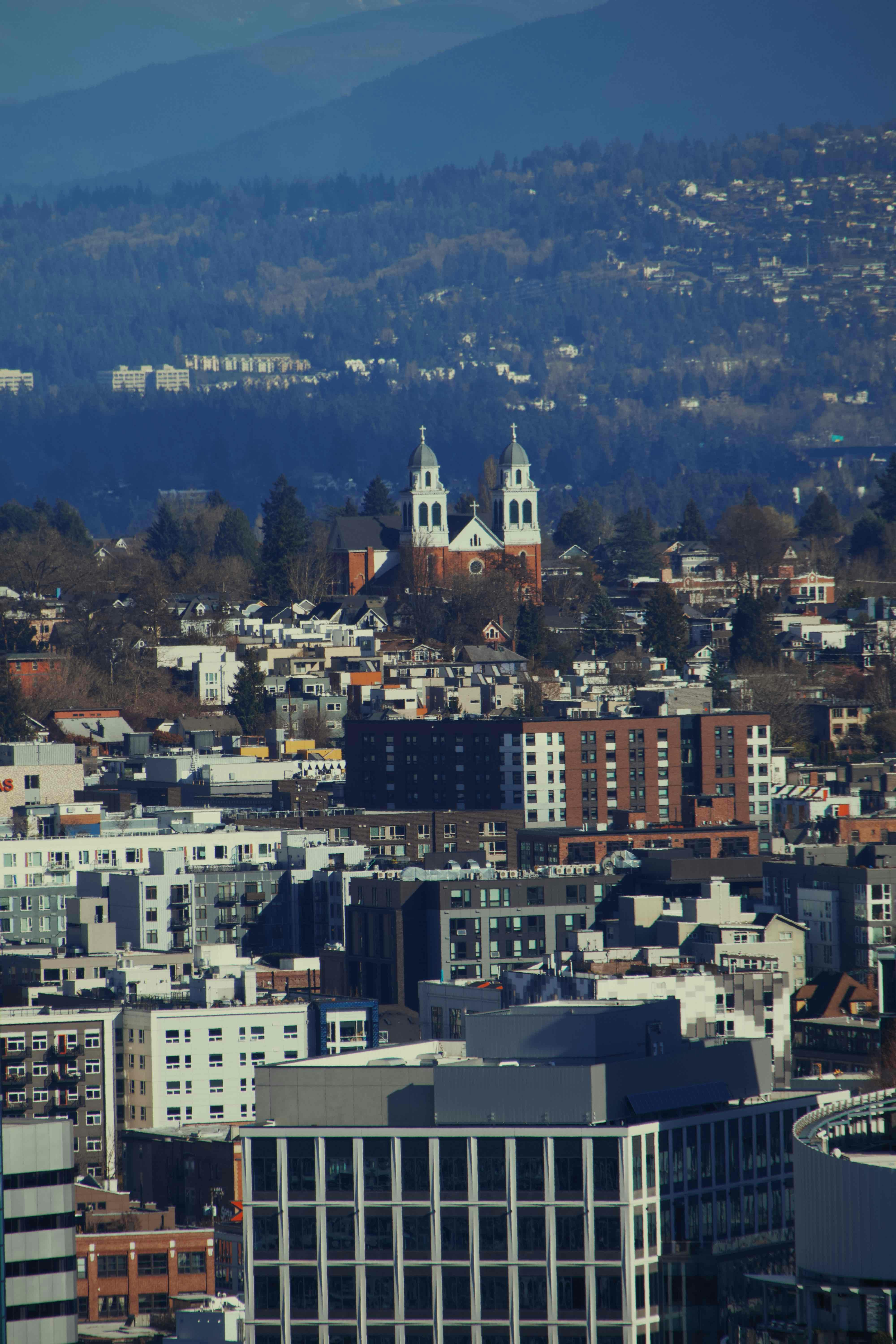 Twin Bell Towers Over a Cityscape
