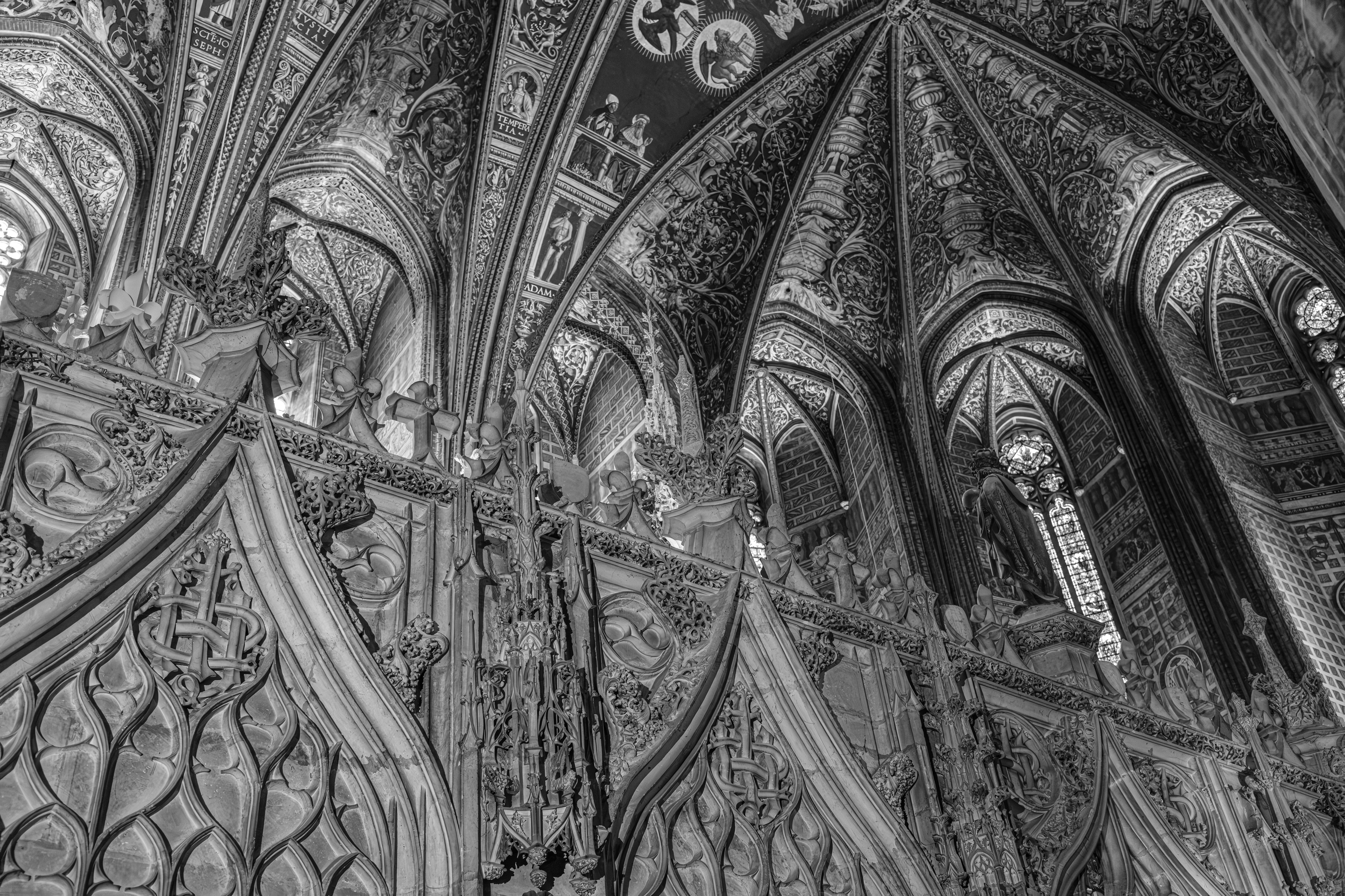 Intricate Gothic Vaults: A Close Harp on Carved Stone and Spirit