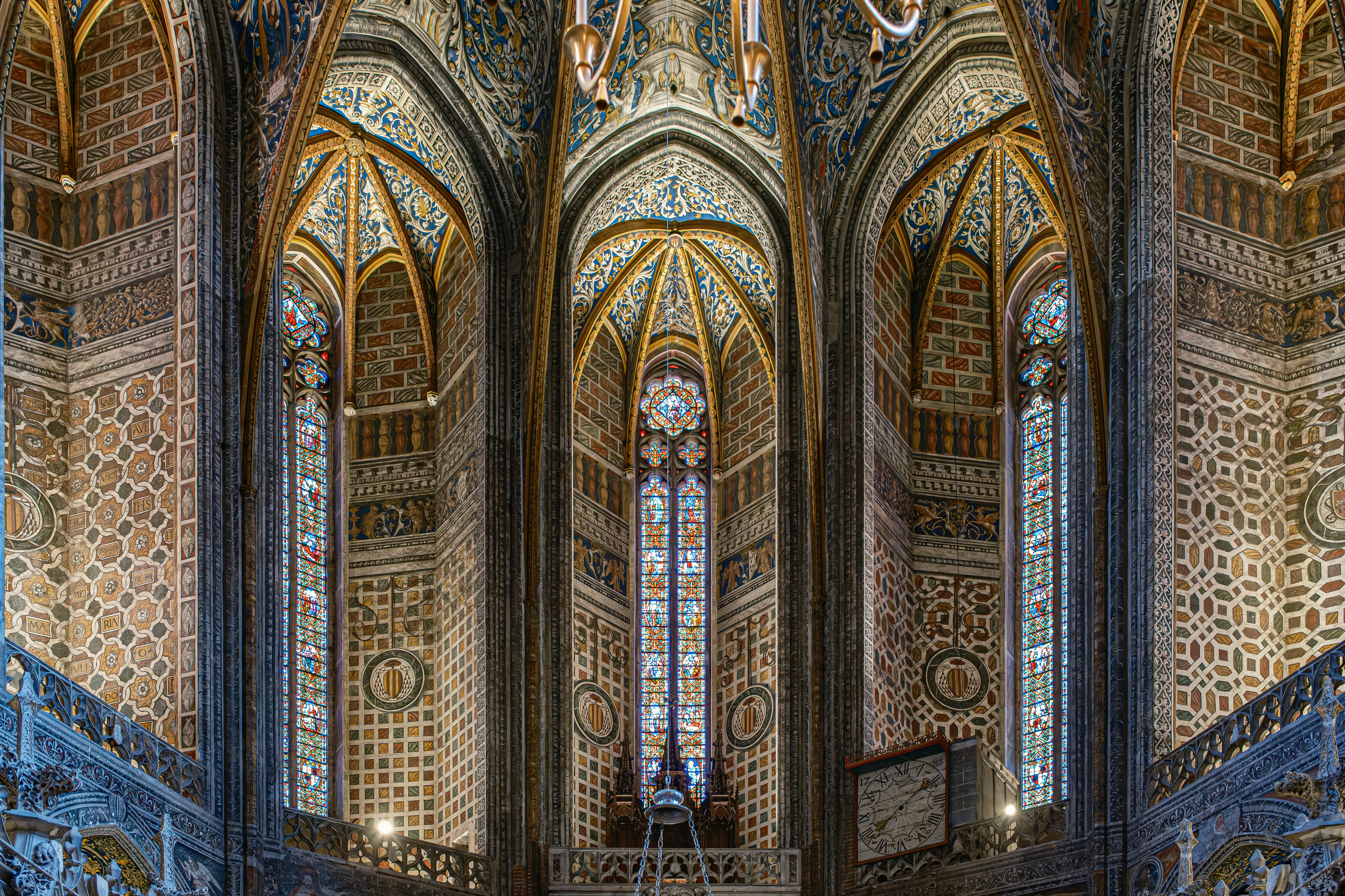 Hushed Vaults: Gothic Spires and Stained Windows Rising Inside a Marble Cathedral