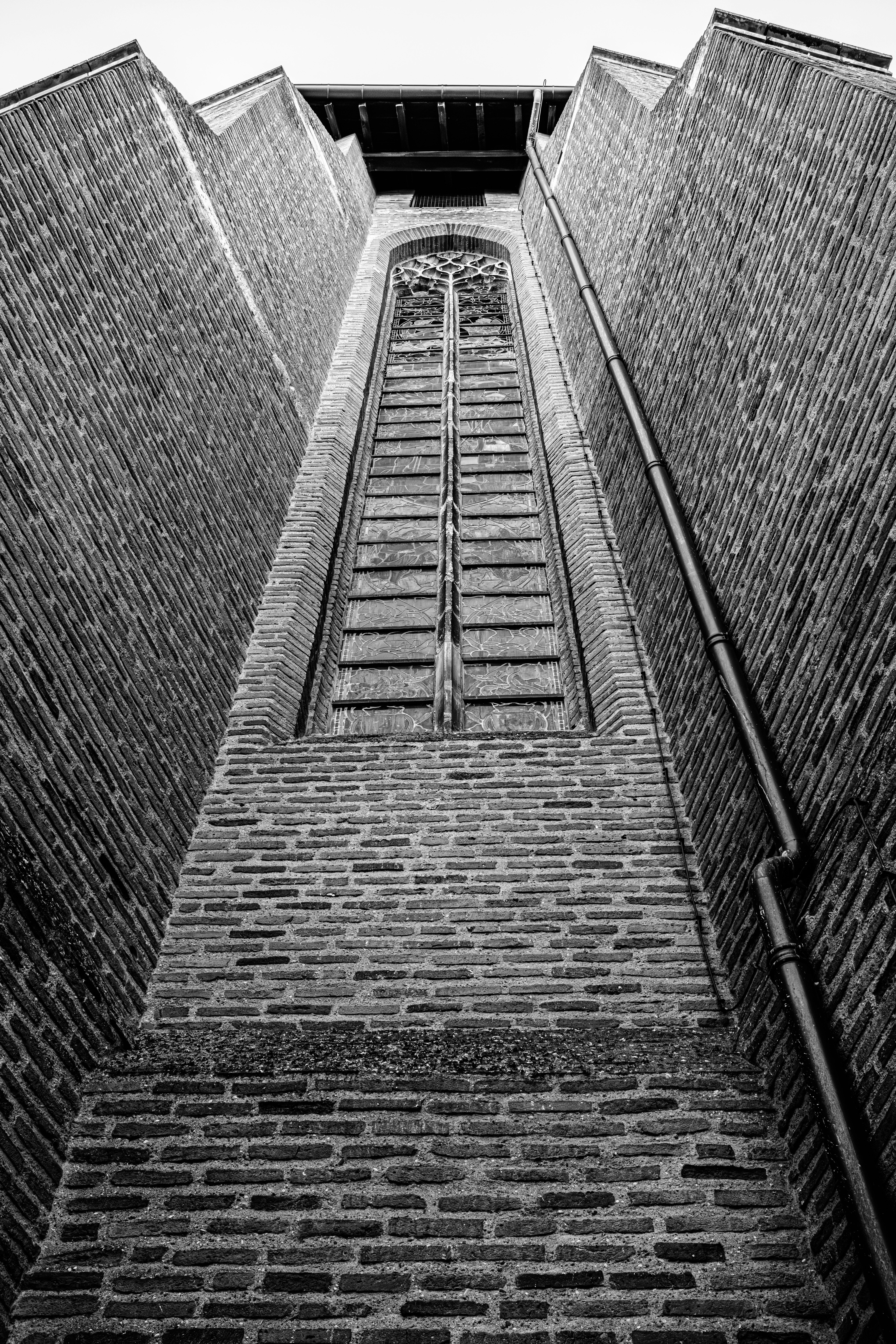 Vertical Gothic Gable: A Brick Canyon Reaching Toward the Sky
