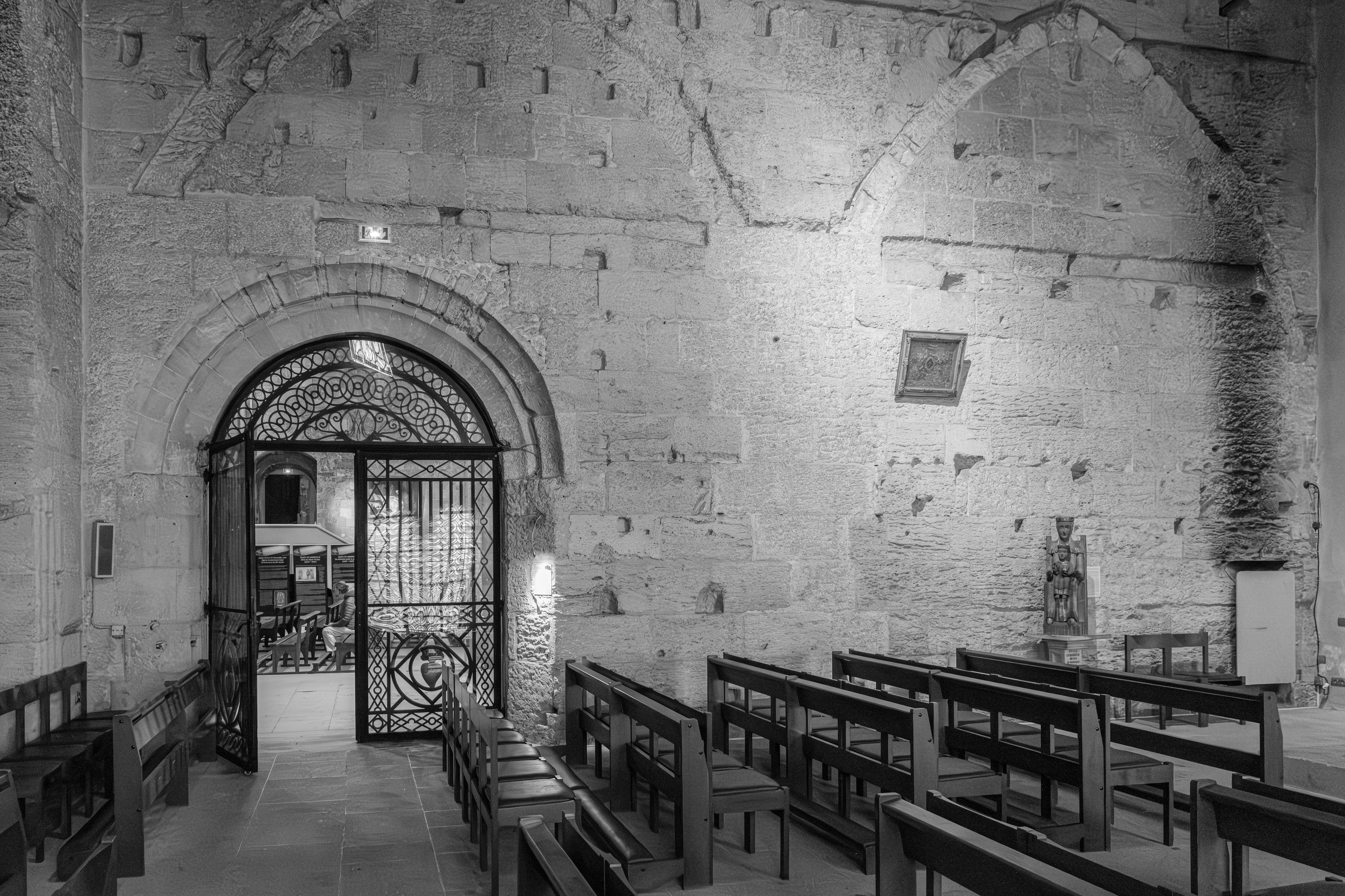 Quiet Vigil at the Archway: Light Through the Gate