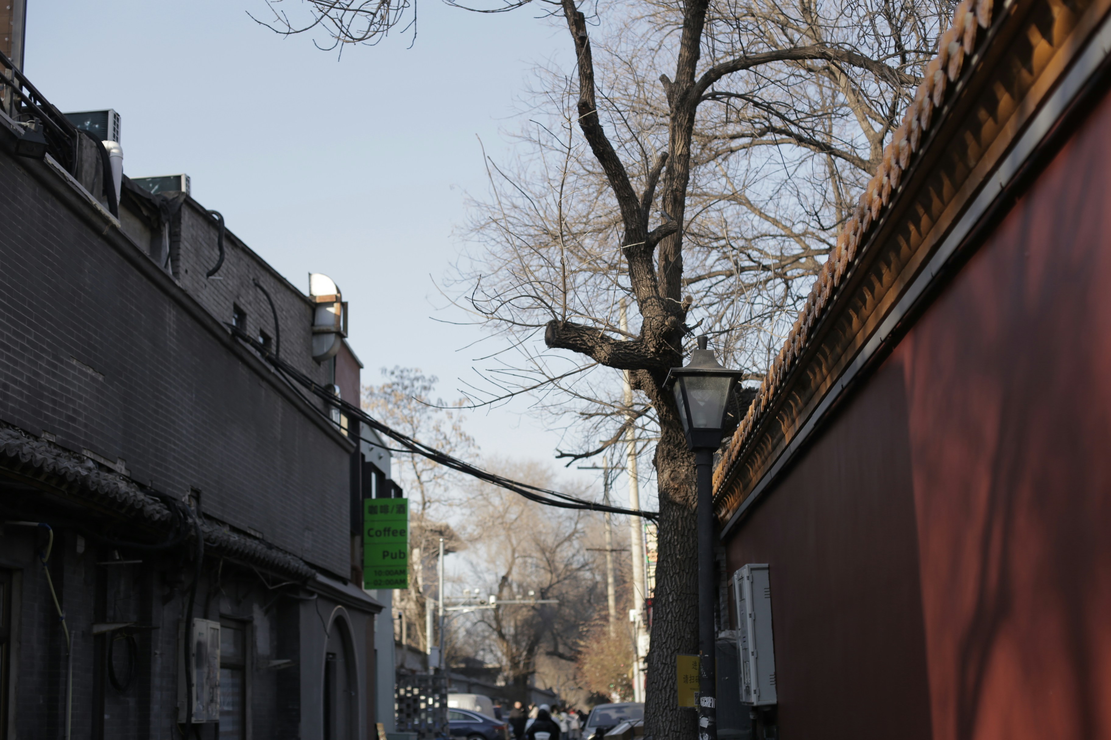 Ancient Alley Vista: Quiet Corner Between Wall and Rooflines