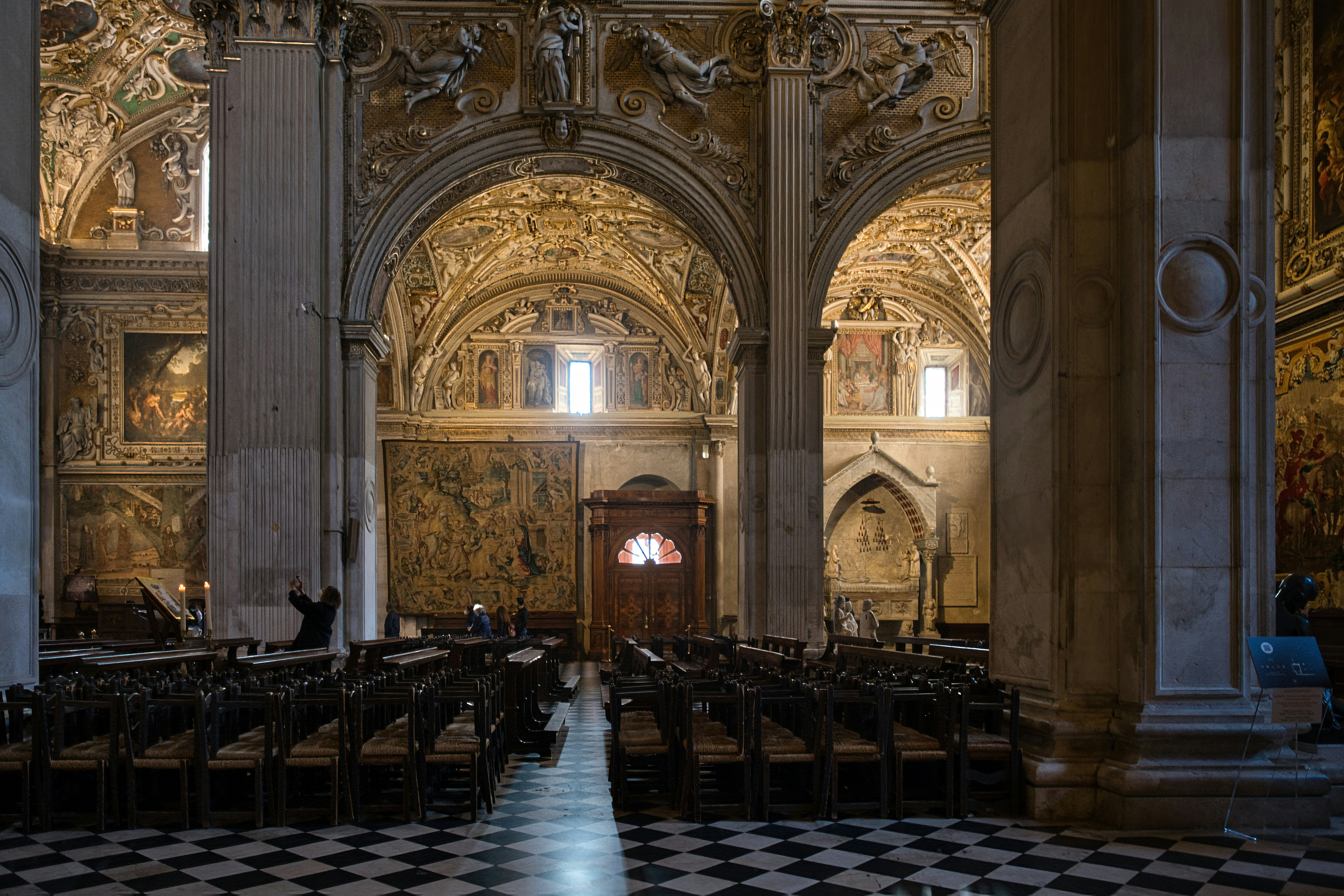 Grand Interior of a Historic Cathedral Hall Embracing Light Through Apse Windows