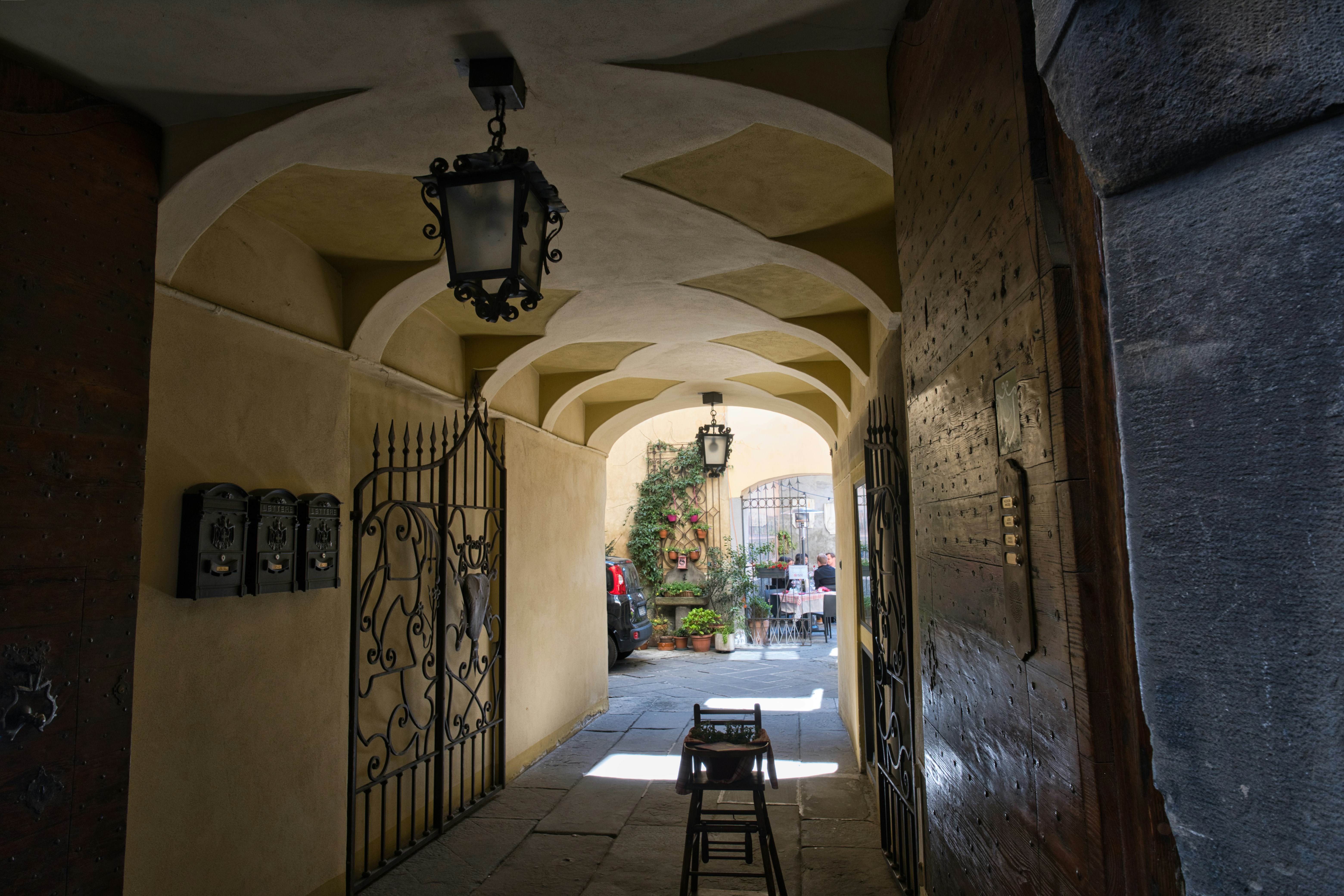 Archway Corridor on a Sunlit Street