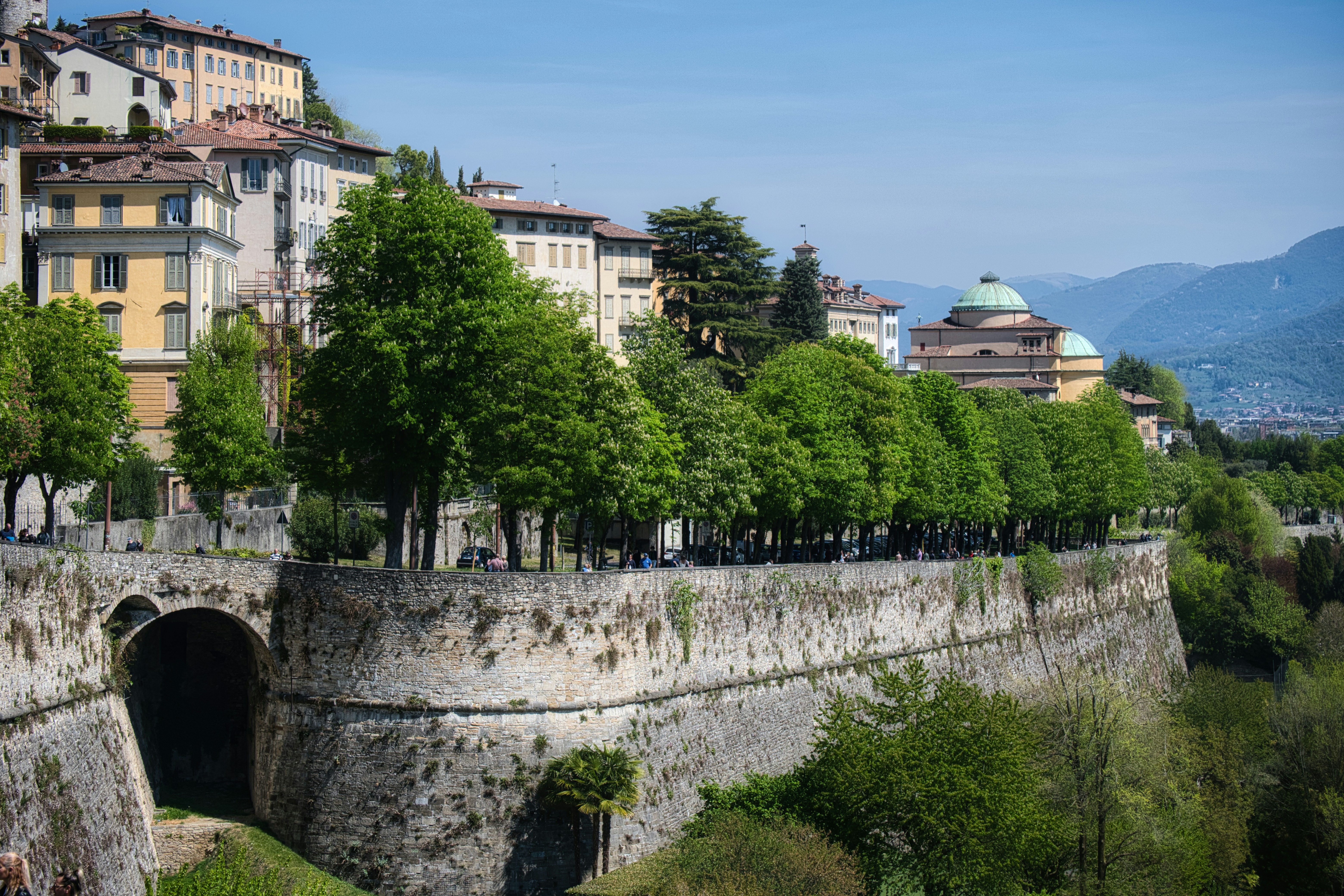 Riverside Terrace: A Tree-Lined Fortress City Along the Italian Hillside