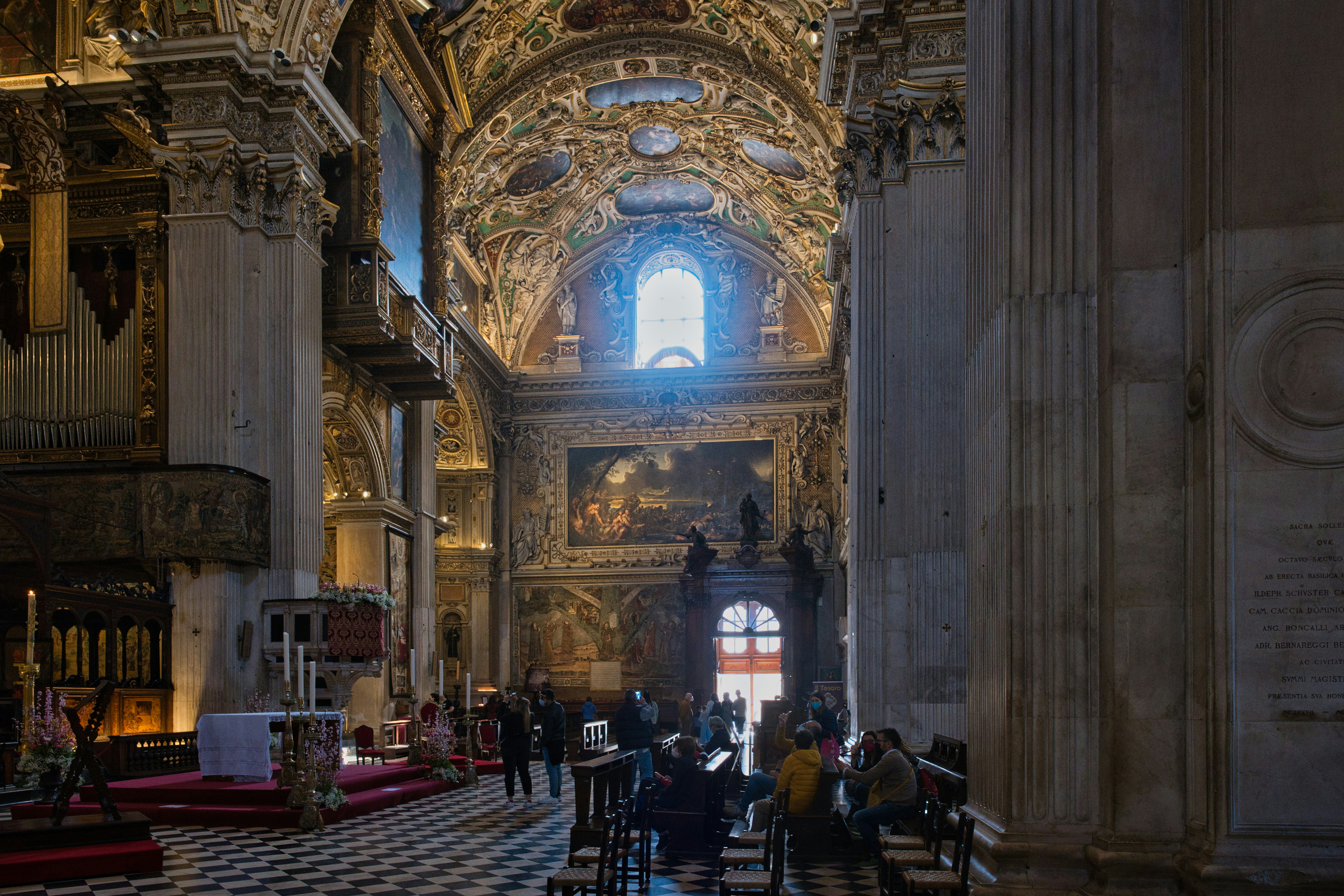 Ornate Cathedral Interior: Light Filtering Through a Central Nave