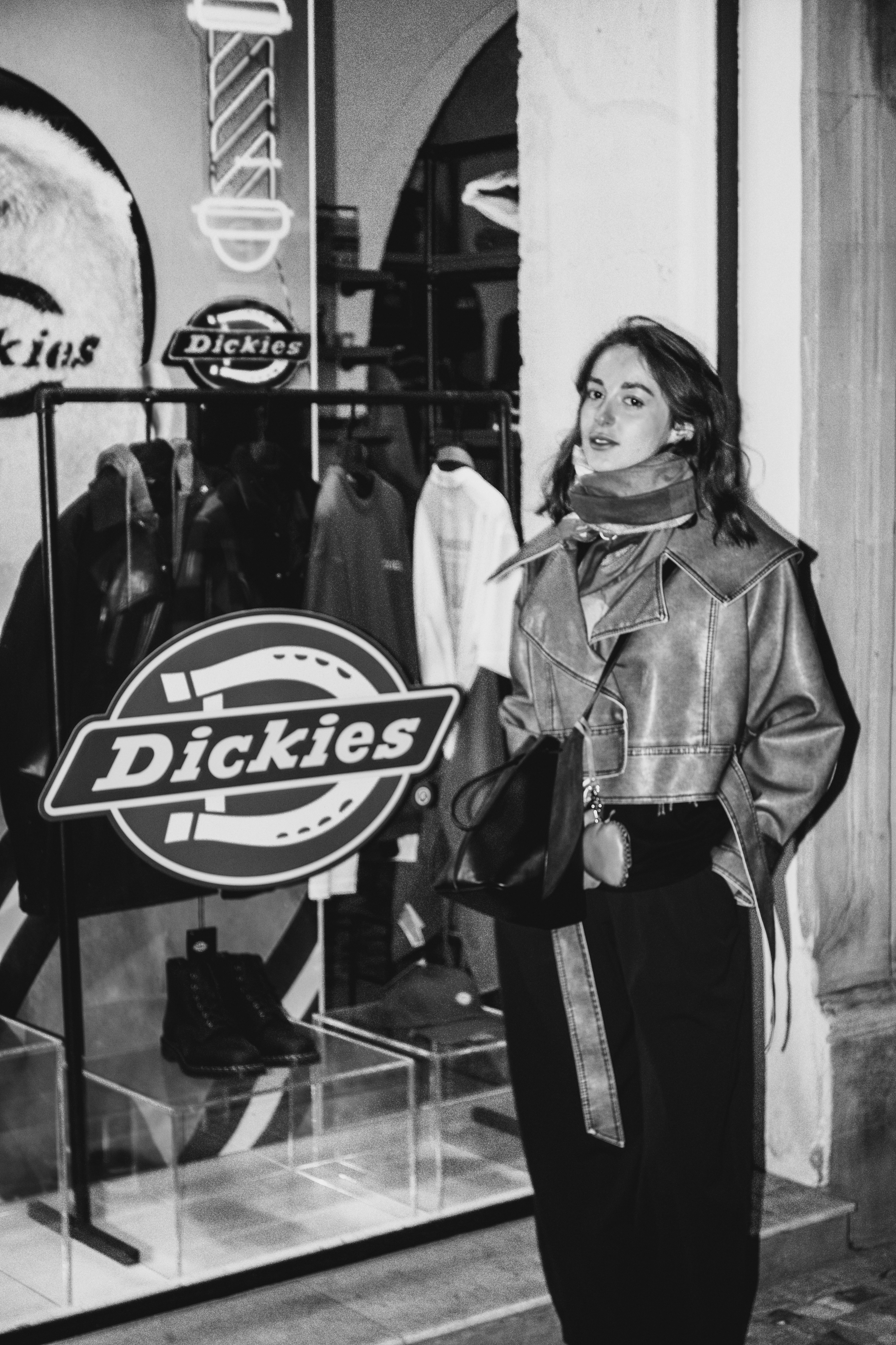 Urban Noir: A Bold Portrait in a Dickies Display Window