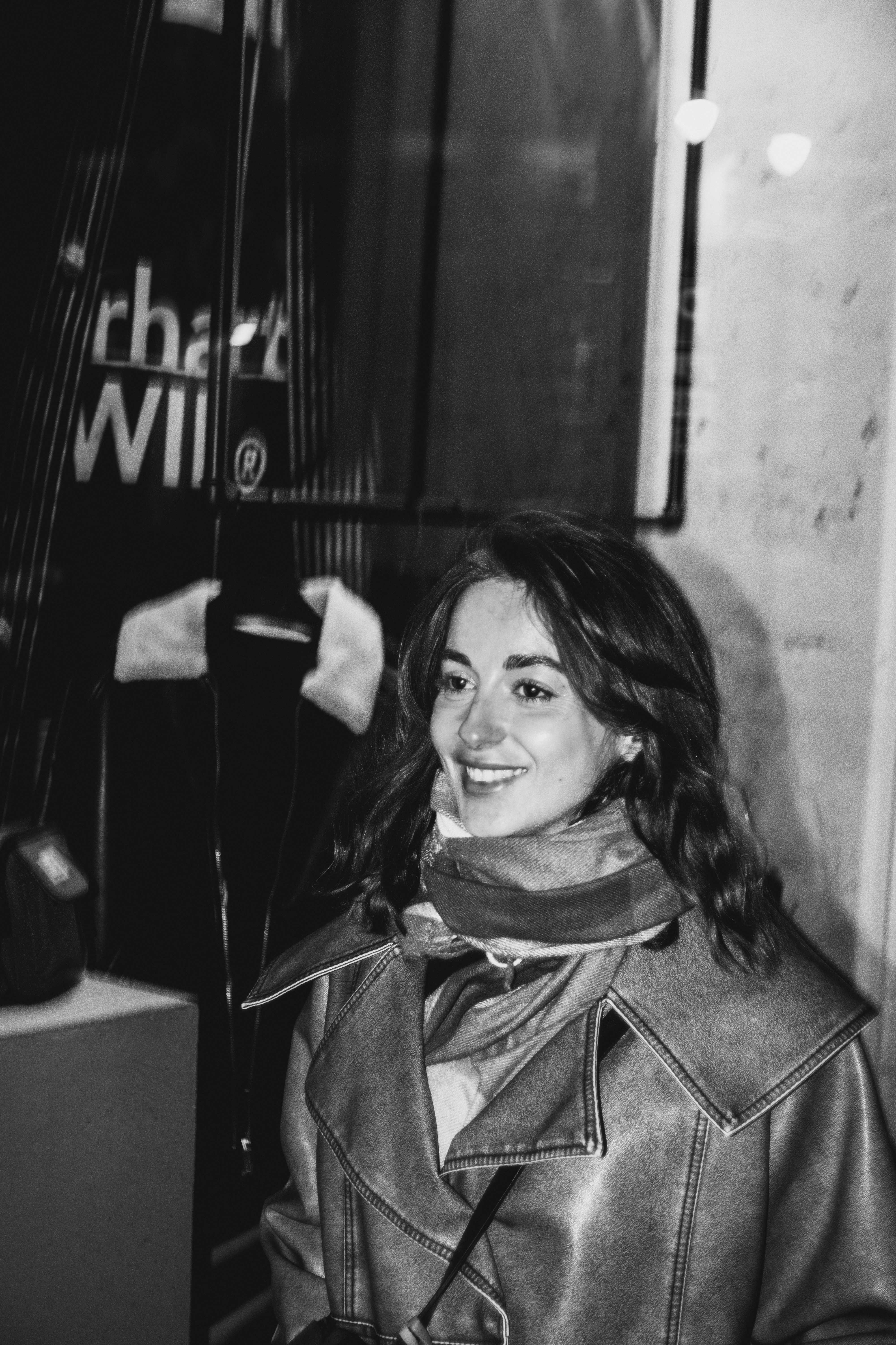 Night Street Portrait: A Smile in Black and White