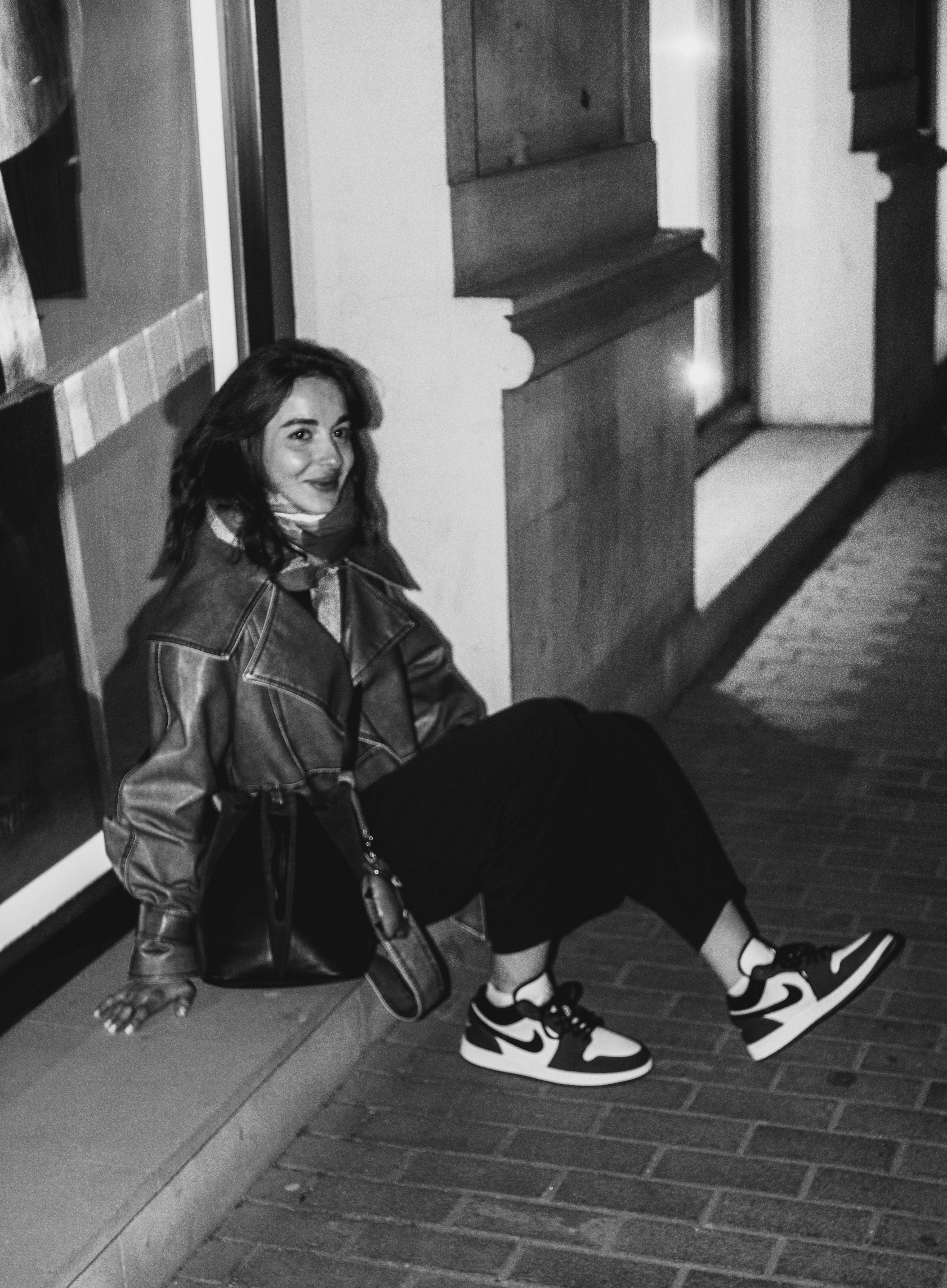 Urban Noir: A Quiet Pause on the City Walk