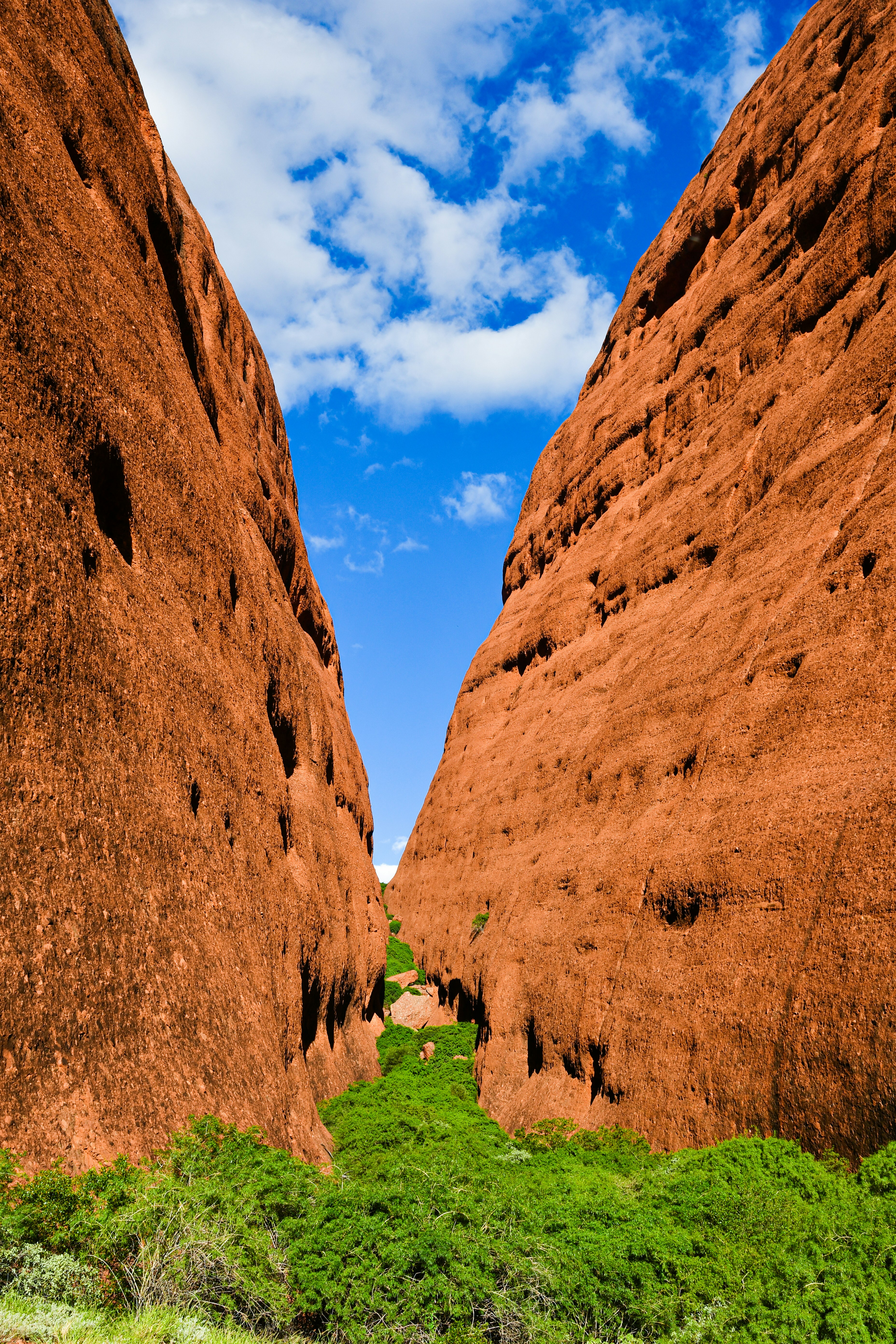 Crimson Canyon Between Sky-Blue Gaps
