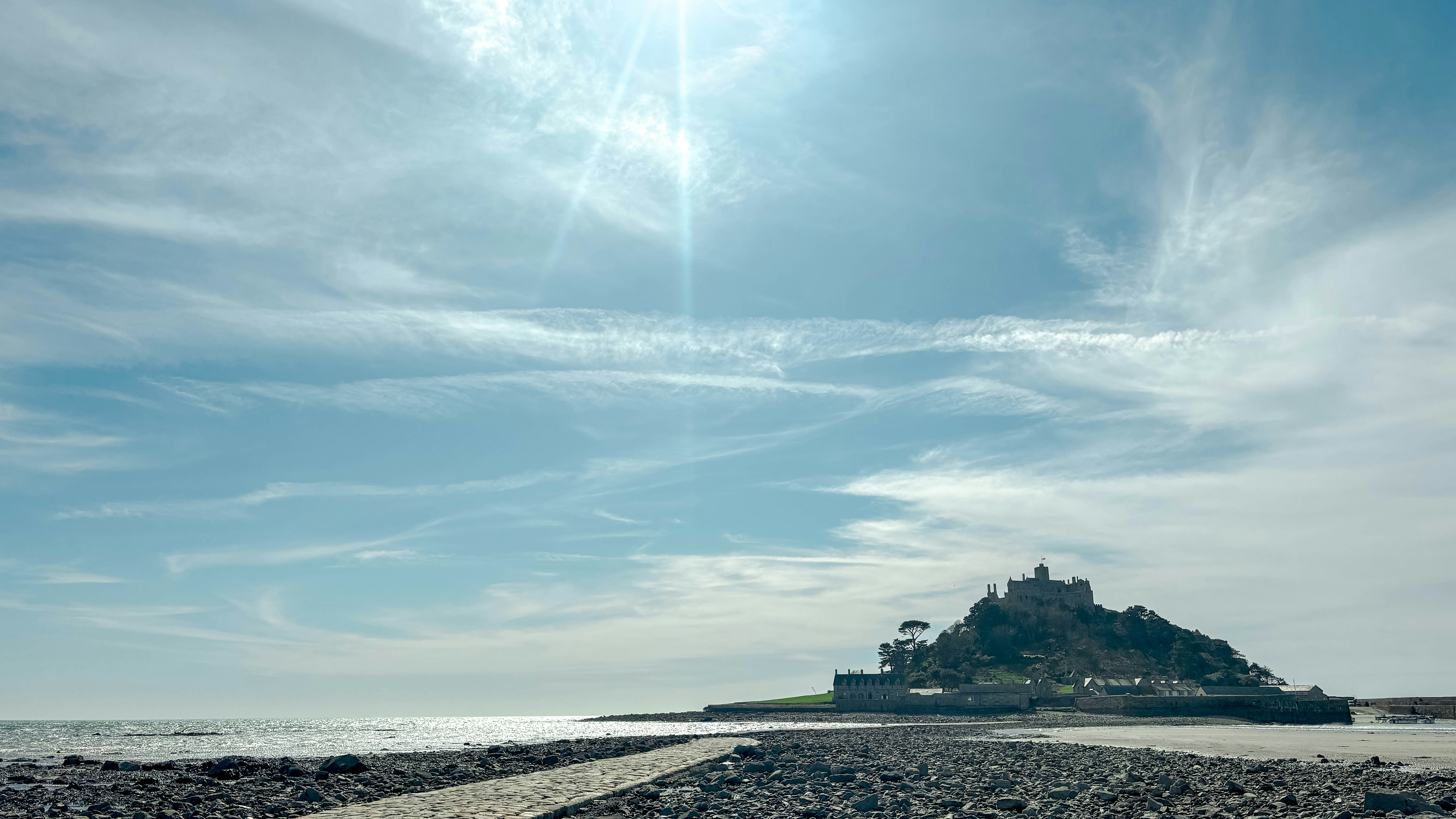Isolated Island Fortress under a Luminous Coastal Sky