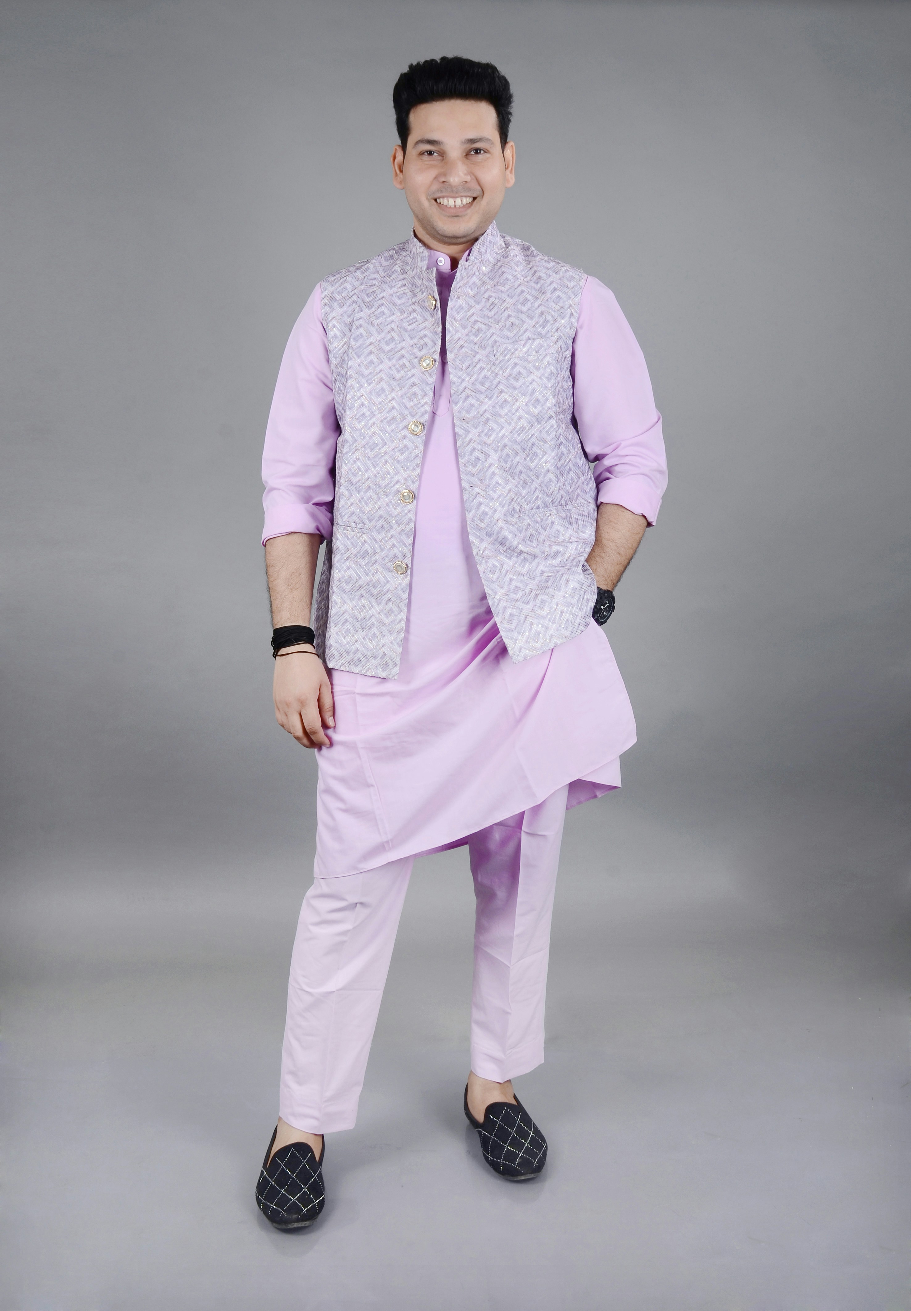 Ivory Mood: A Gentleman in Lilac Attire Poses confidently