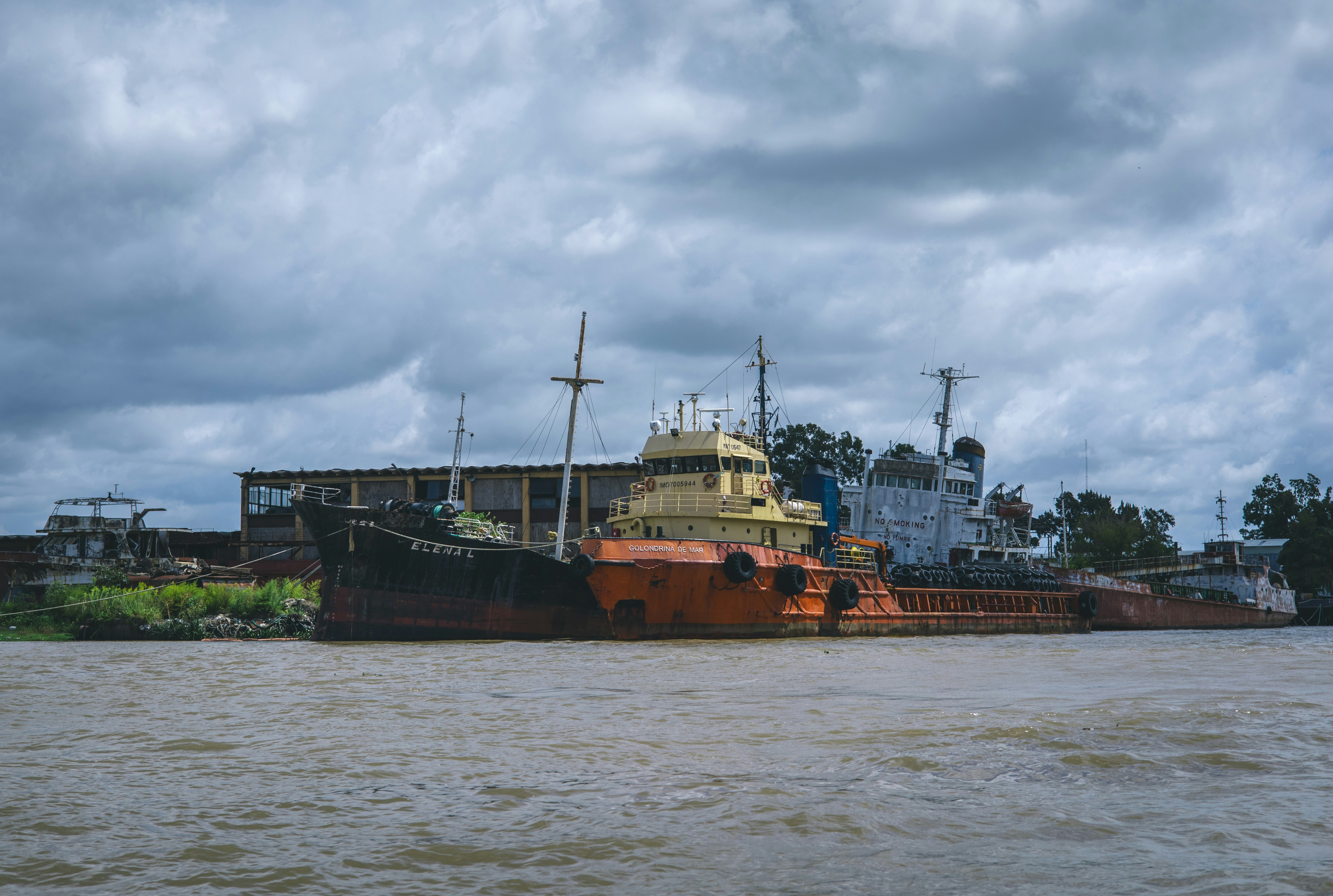 Industrial Wake: A Rosy Hull and the River's Edge