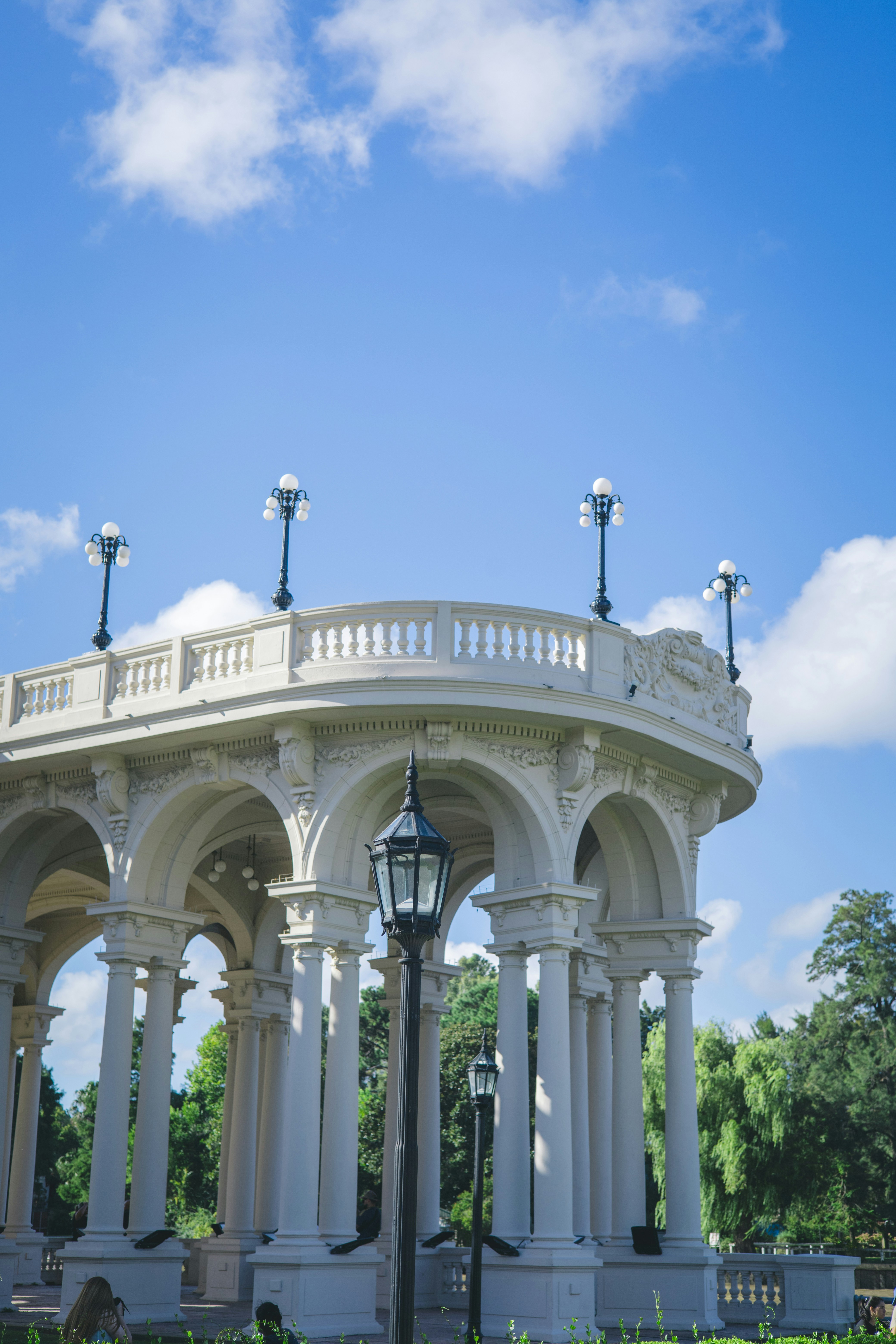Classical Arcade in White Marble Under a Bright Sky
