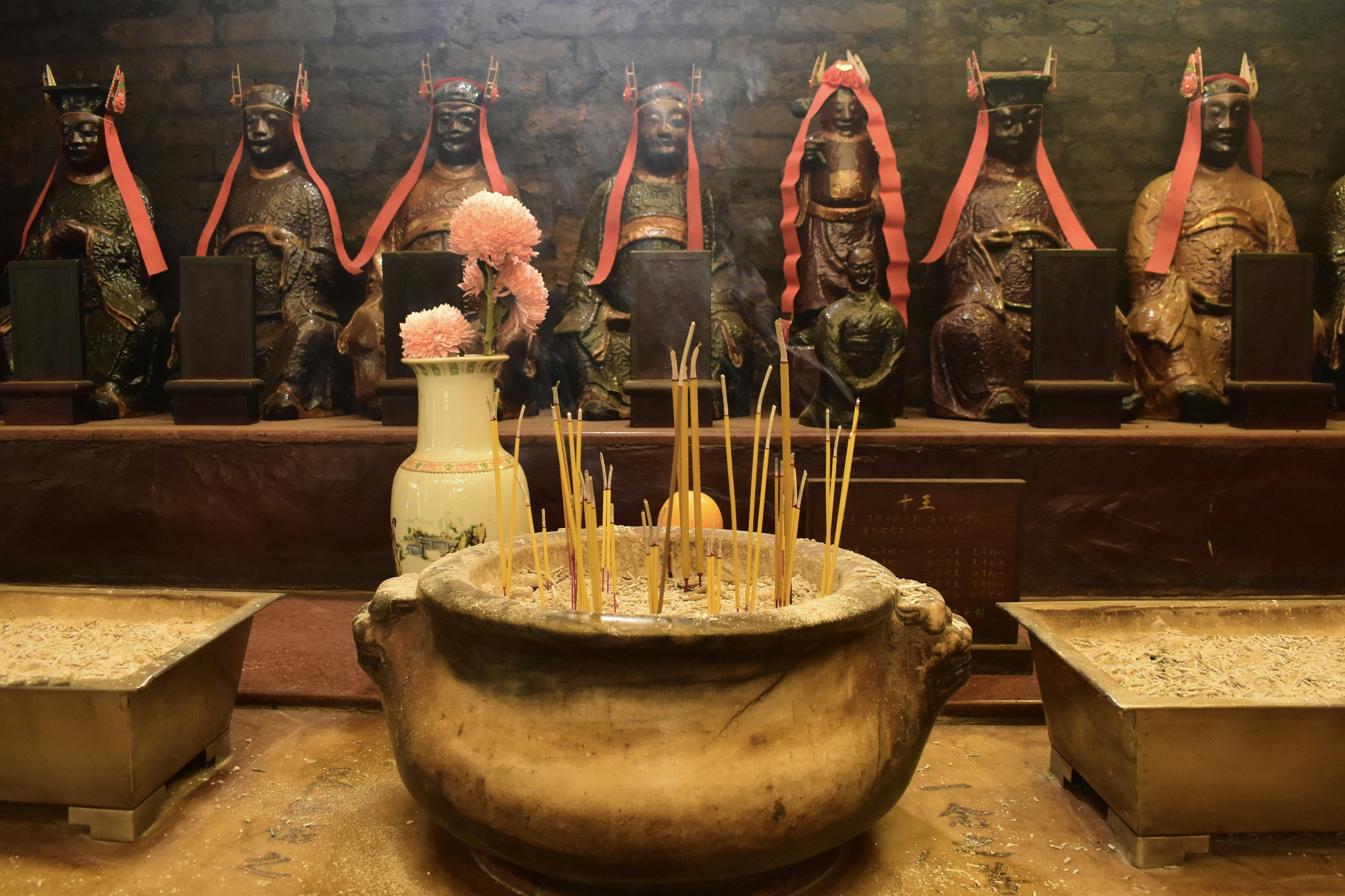 Incense and Ancestors: Ritual Vessel Before The Row of Shrine Figures
